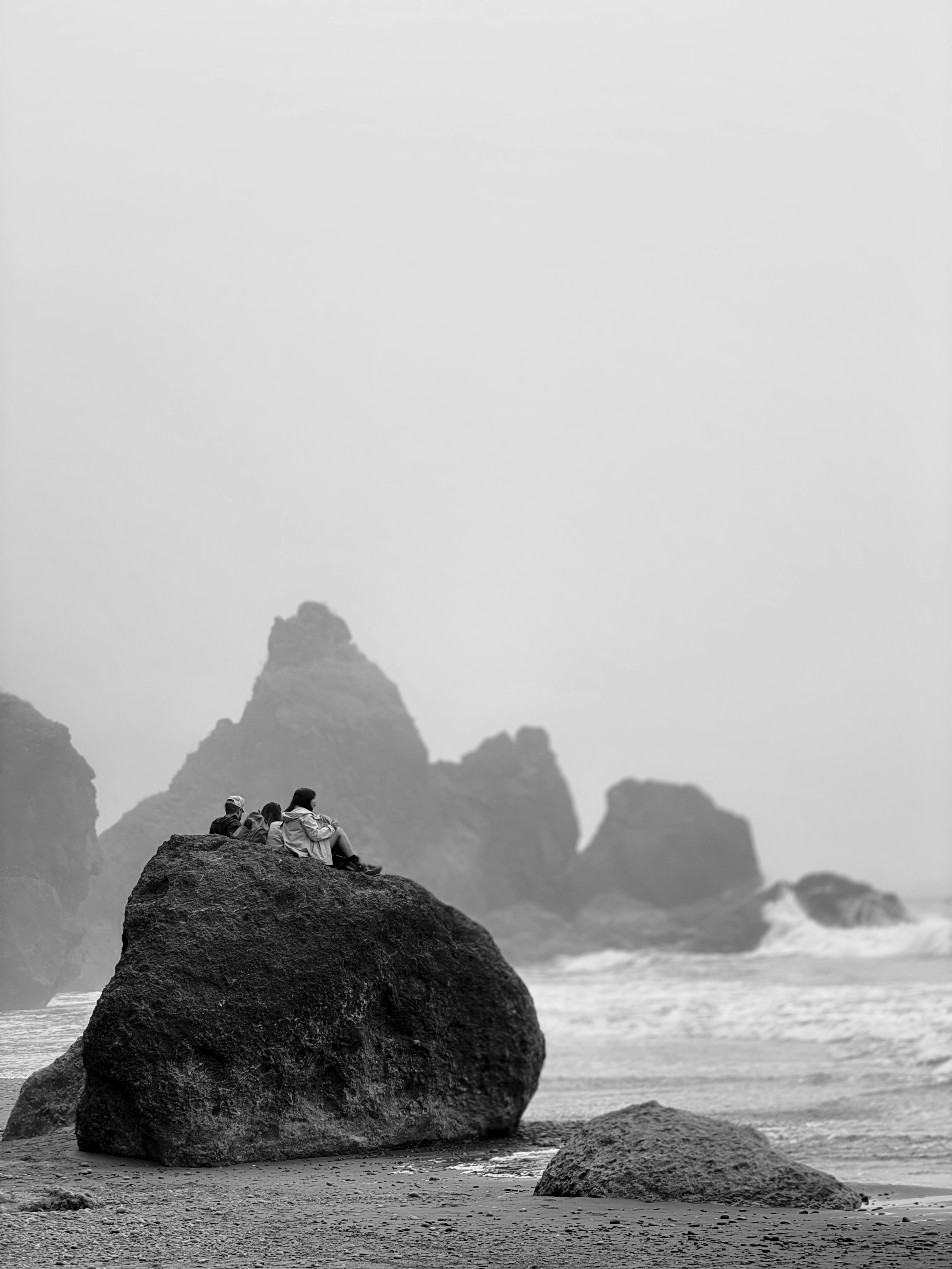 Rockbound Silence: A Family Gaze Over the Sea