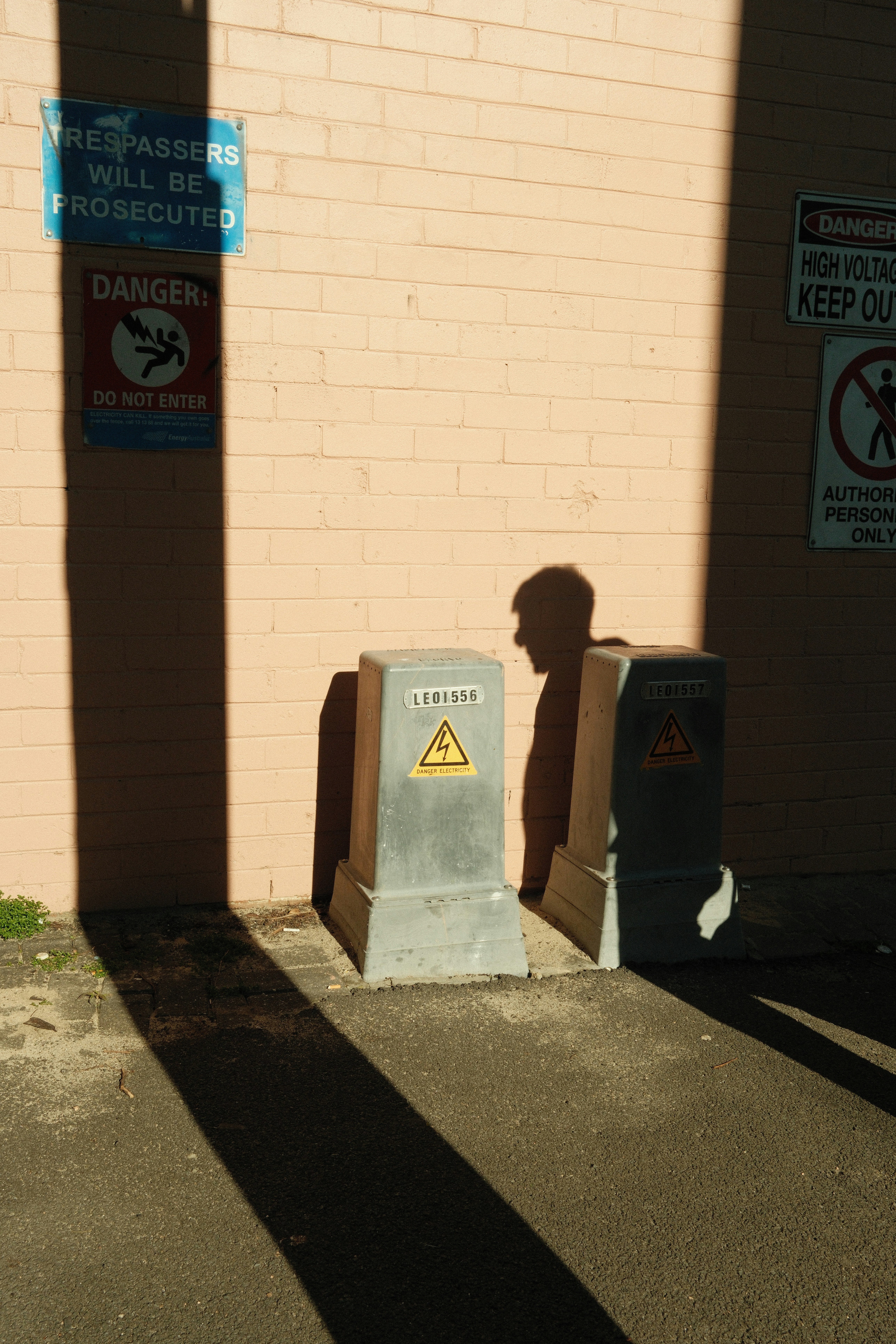 Shadowed Power: Concrete Boxes and Dim Warning