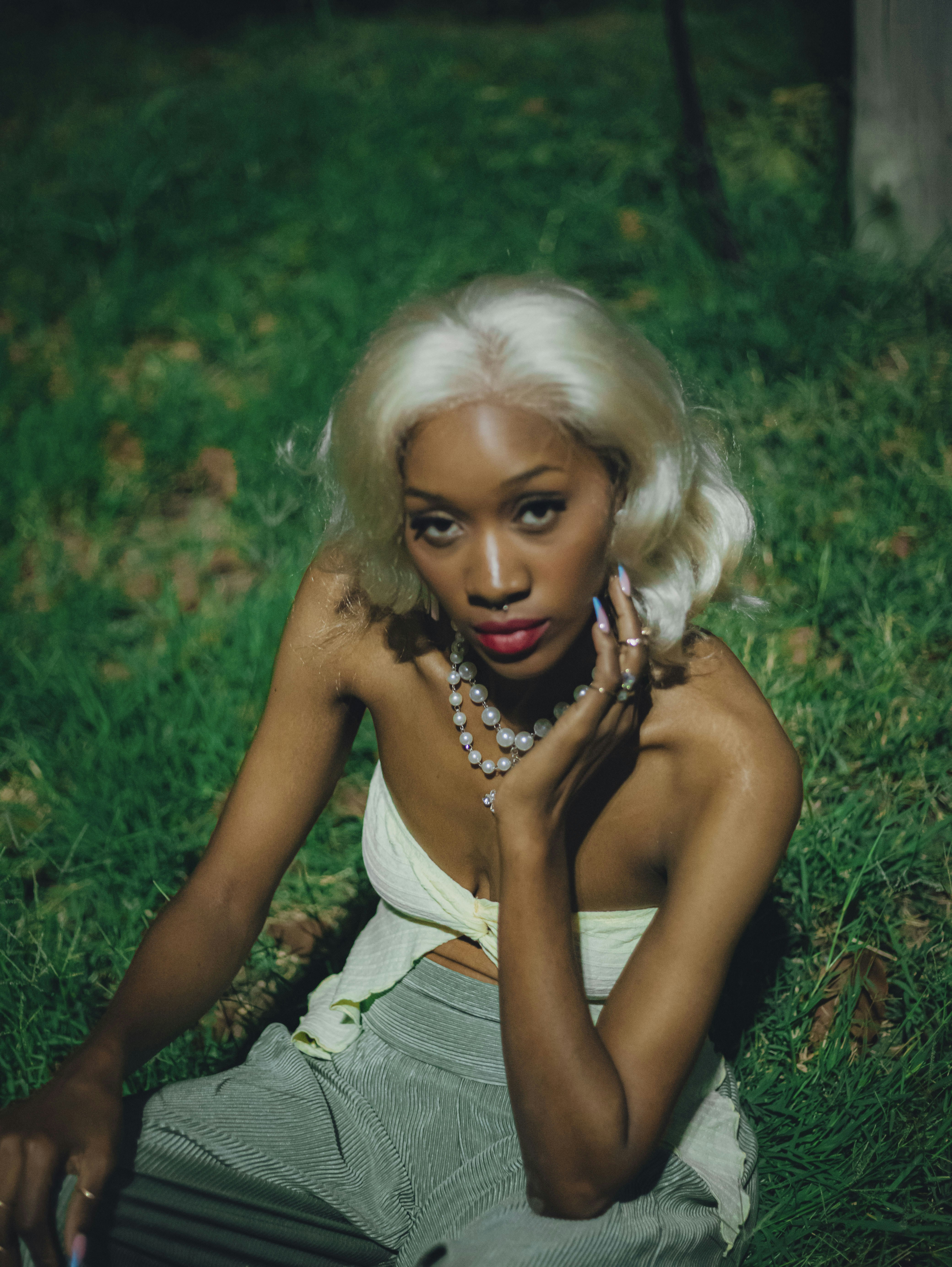 Emerald Night: Portrait in a Sunlit Meadow