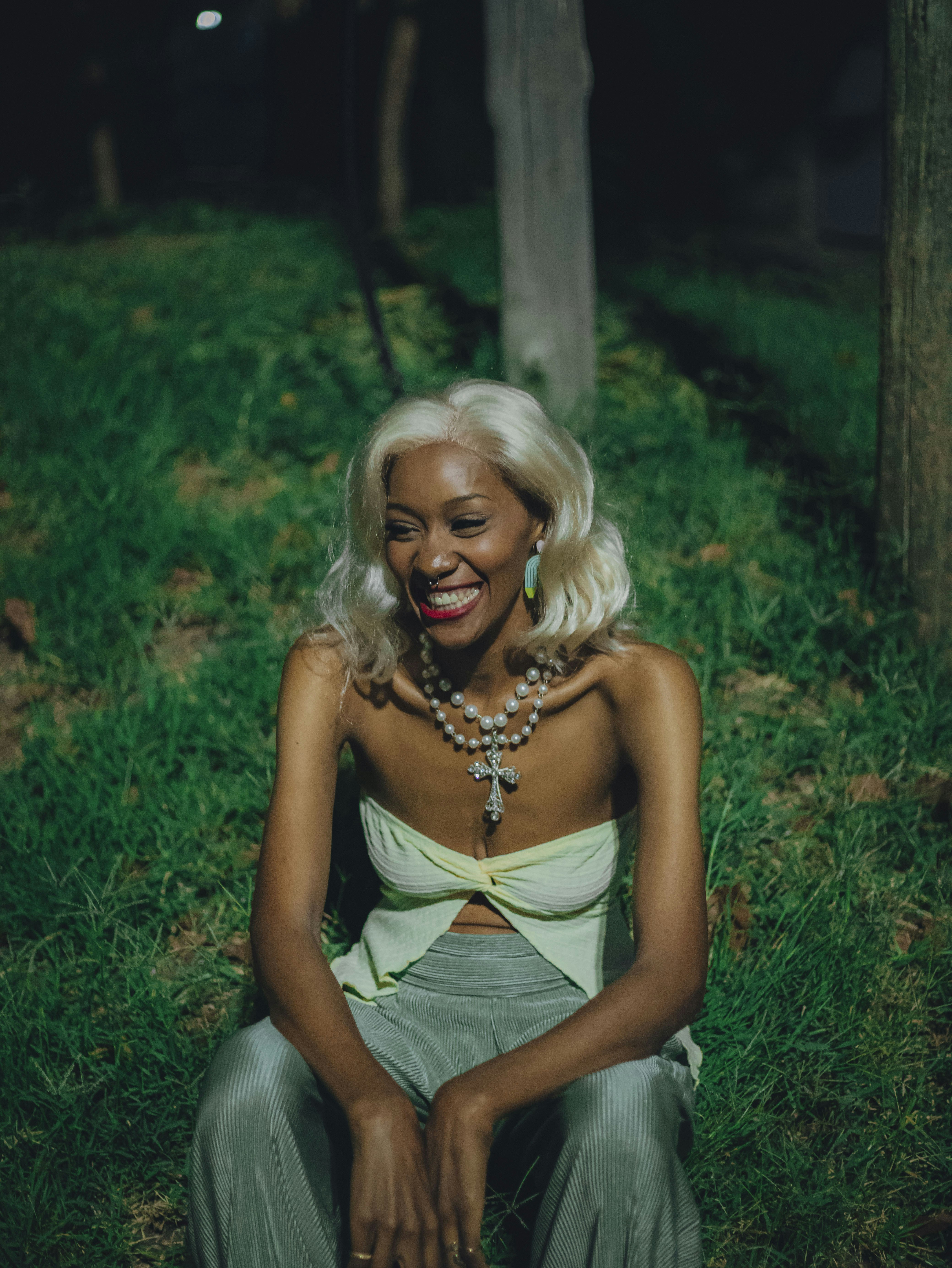 Radiant Smile Under Night Garden Lights
