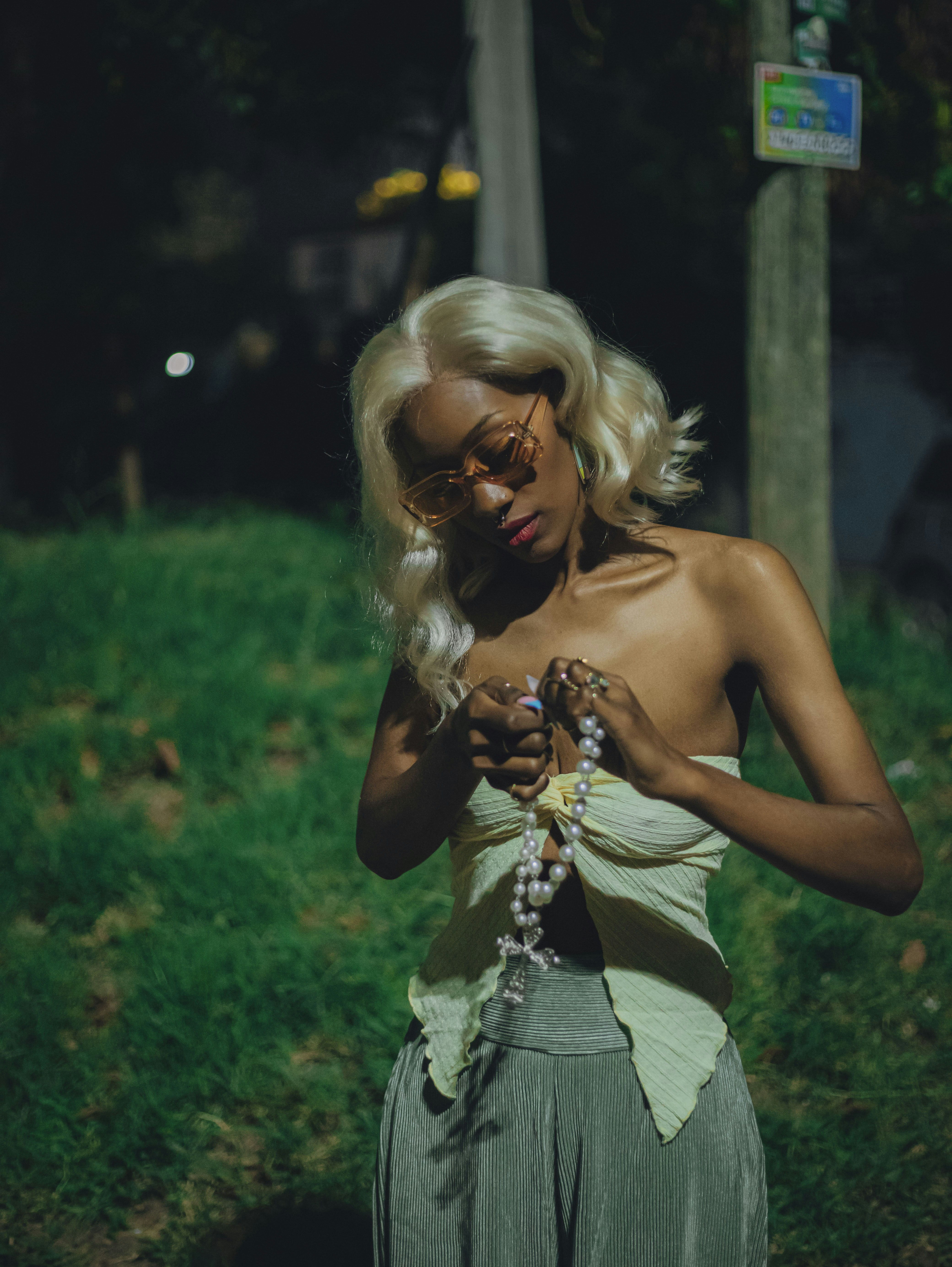 Pearl Beads in Moonlit Neon: A Night Portrait