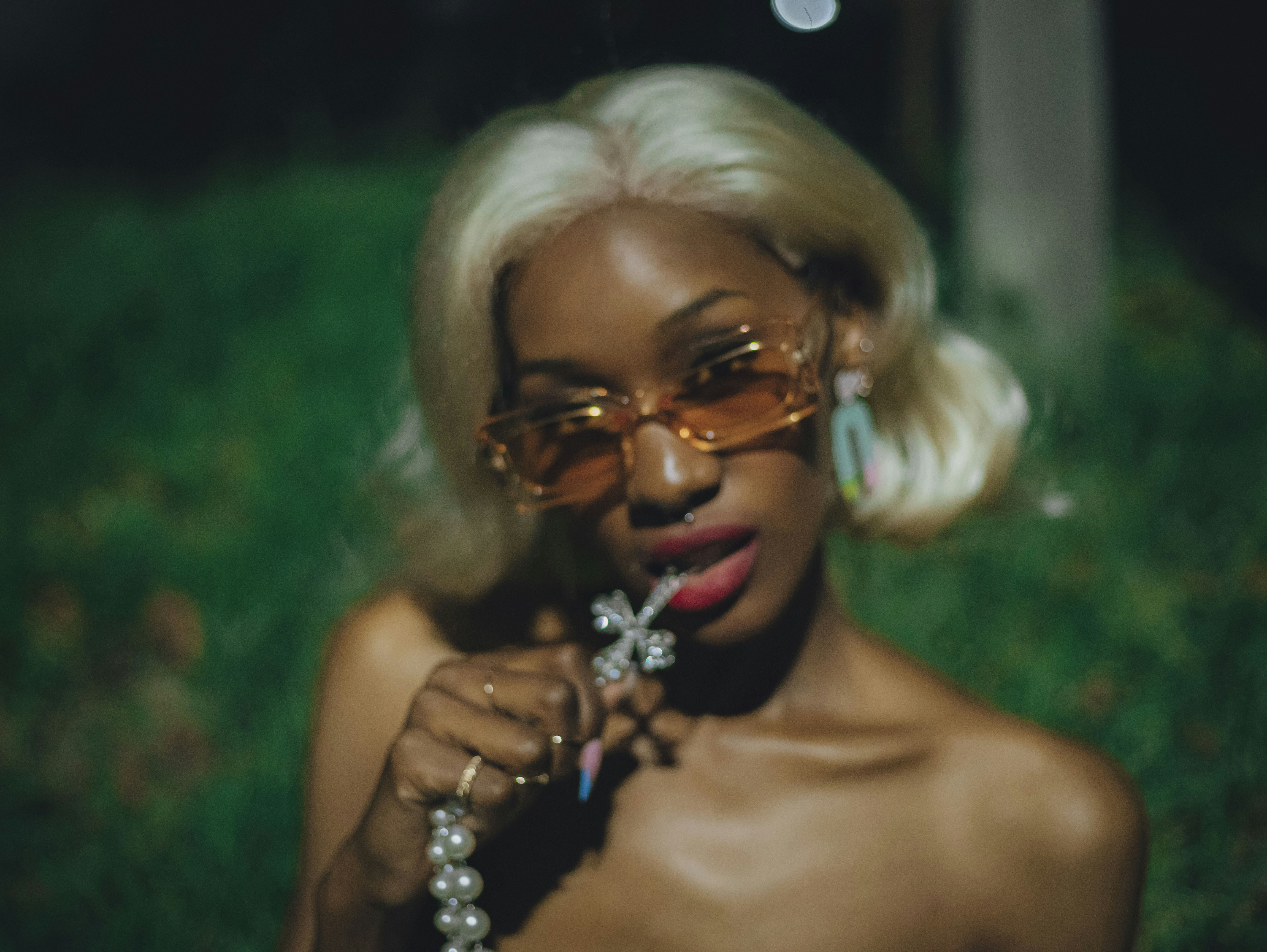 Shimmering Confessions: A Night Scene with Bold Shades