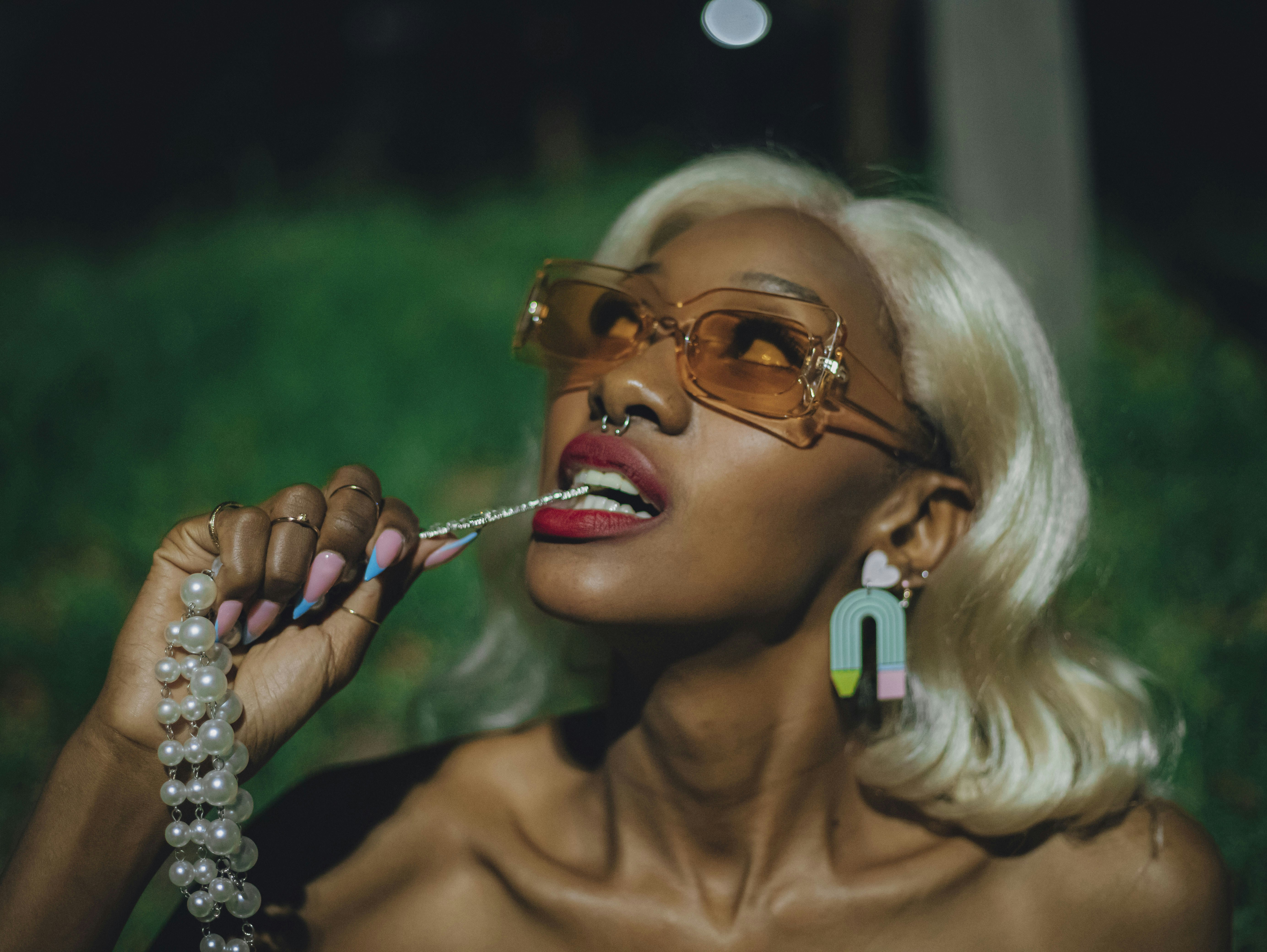 Neon Stare: Glamour Under Green Night Lights
