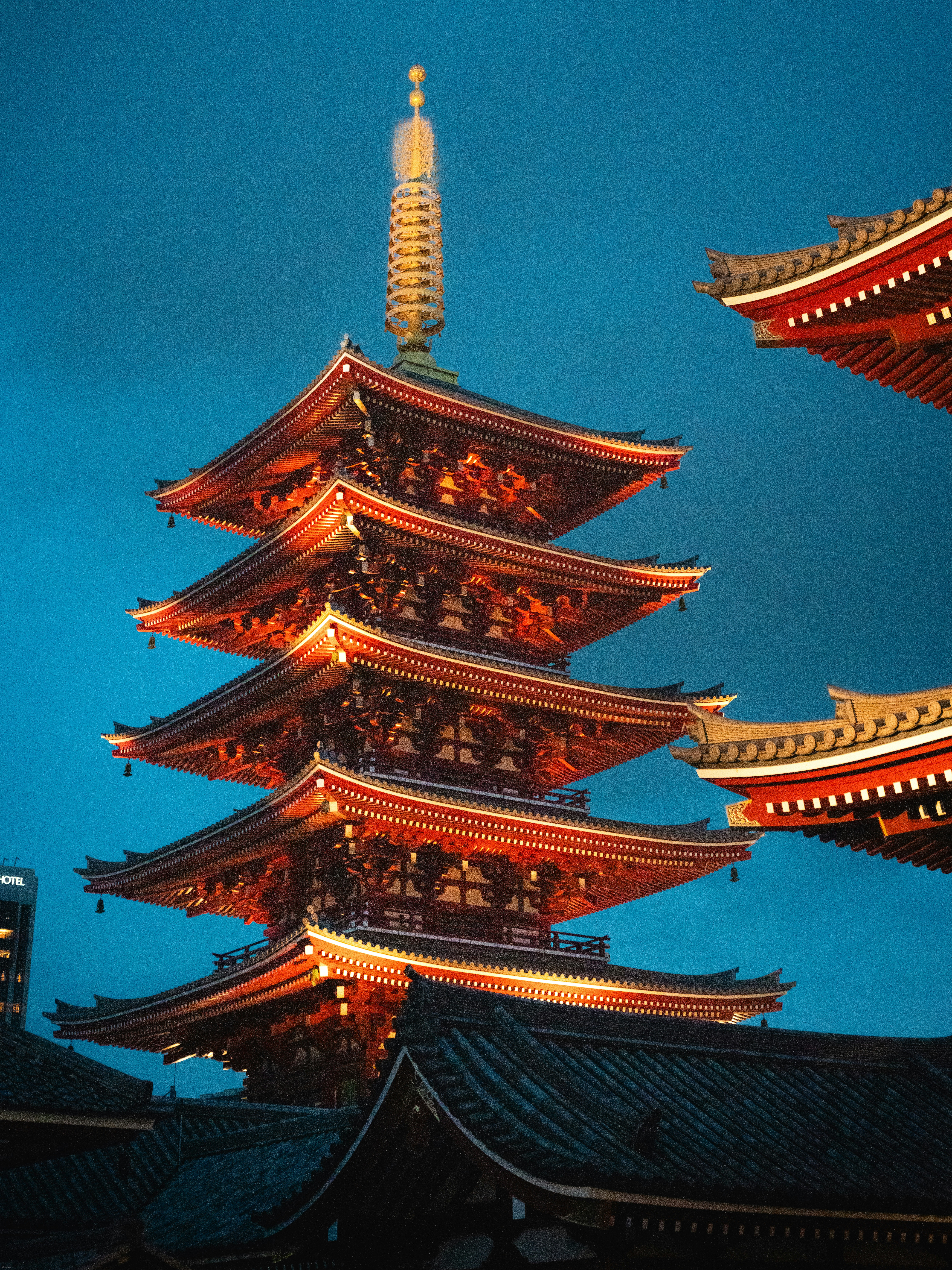 Evening Lantern: A Towering Pagoda Reaches for the Blue Hour Sky