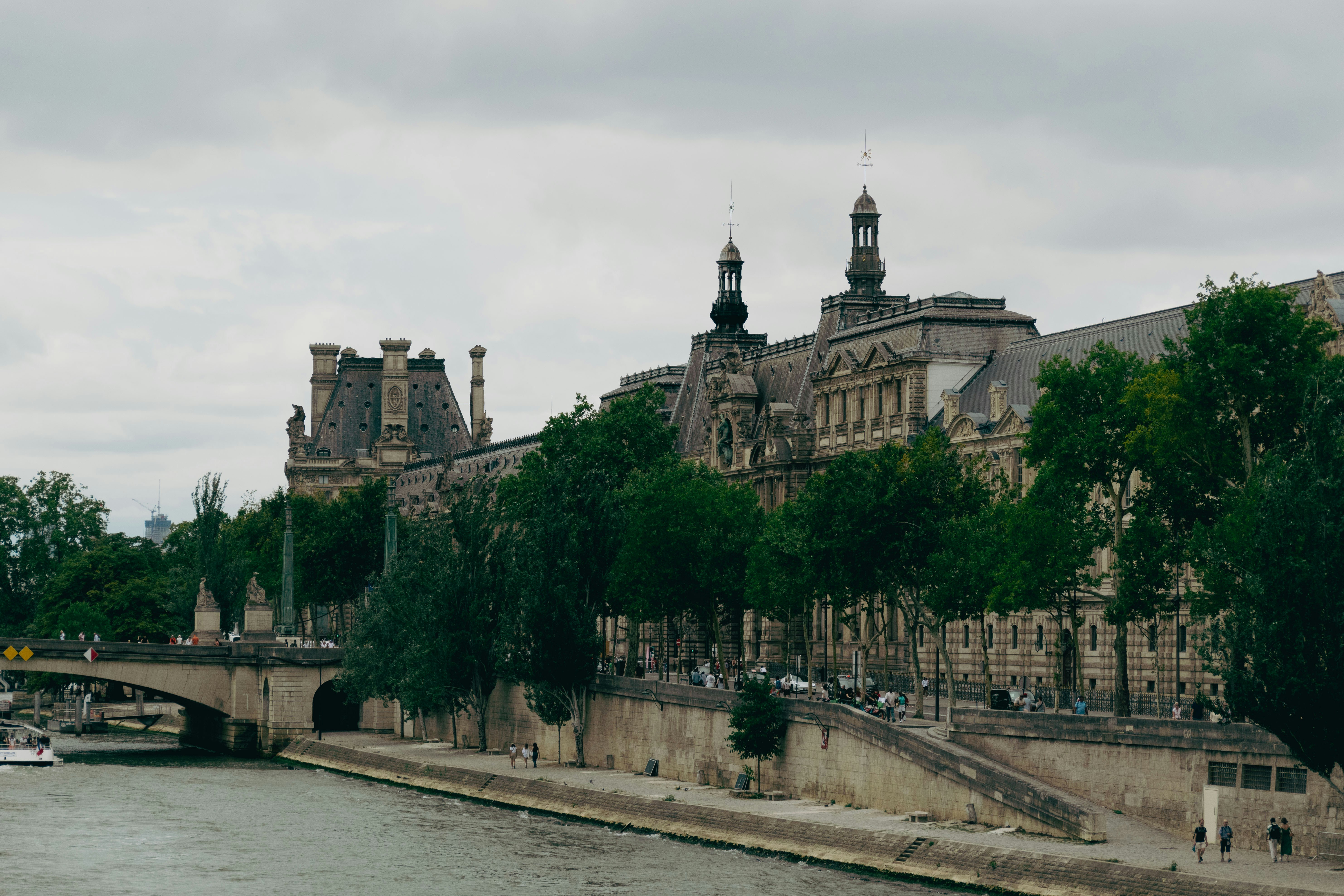 Riverside Facade: A Historic Cityscape Framed by Trees