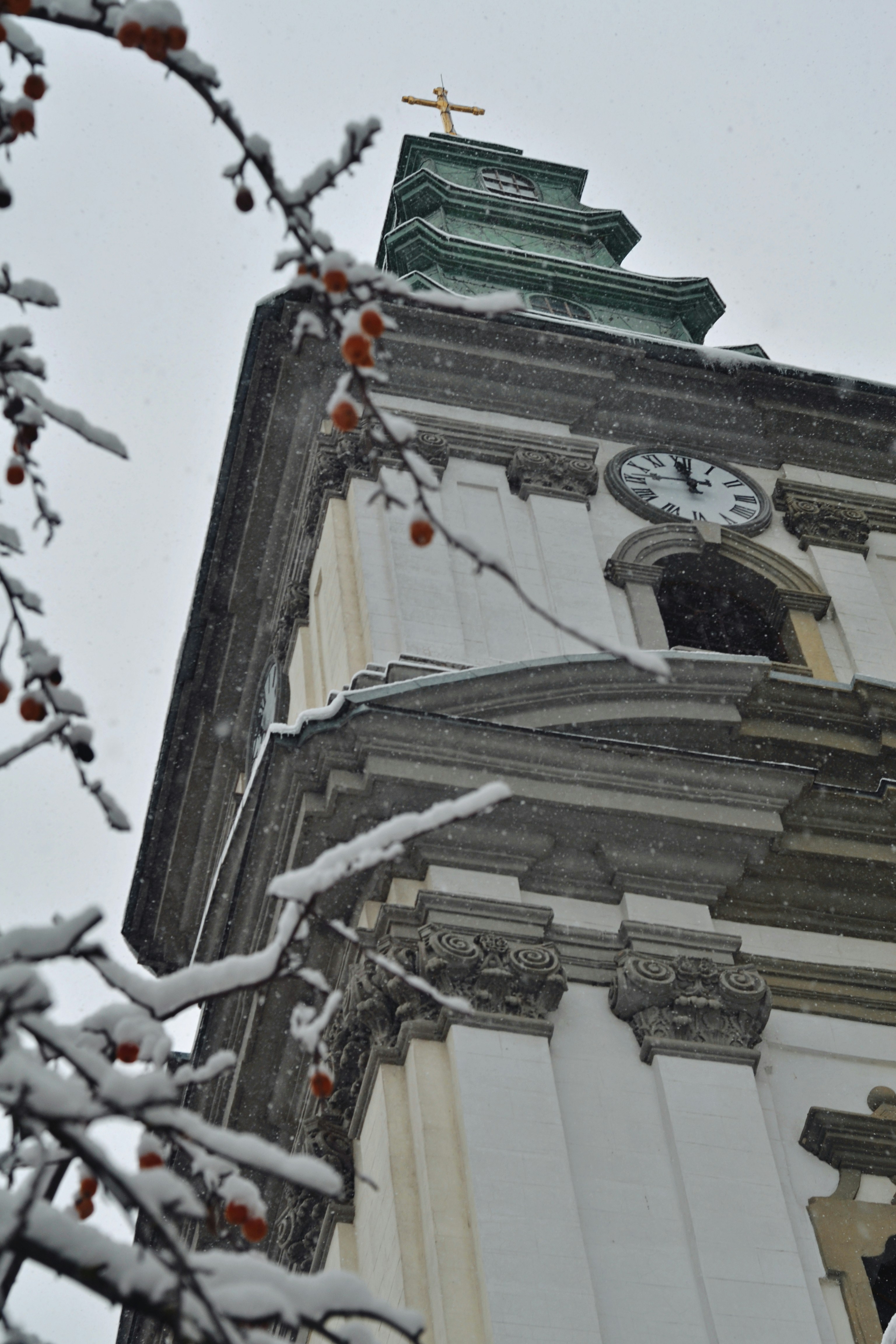 Snowy Clock Tower Reaches for the Sky
