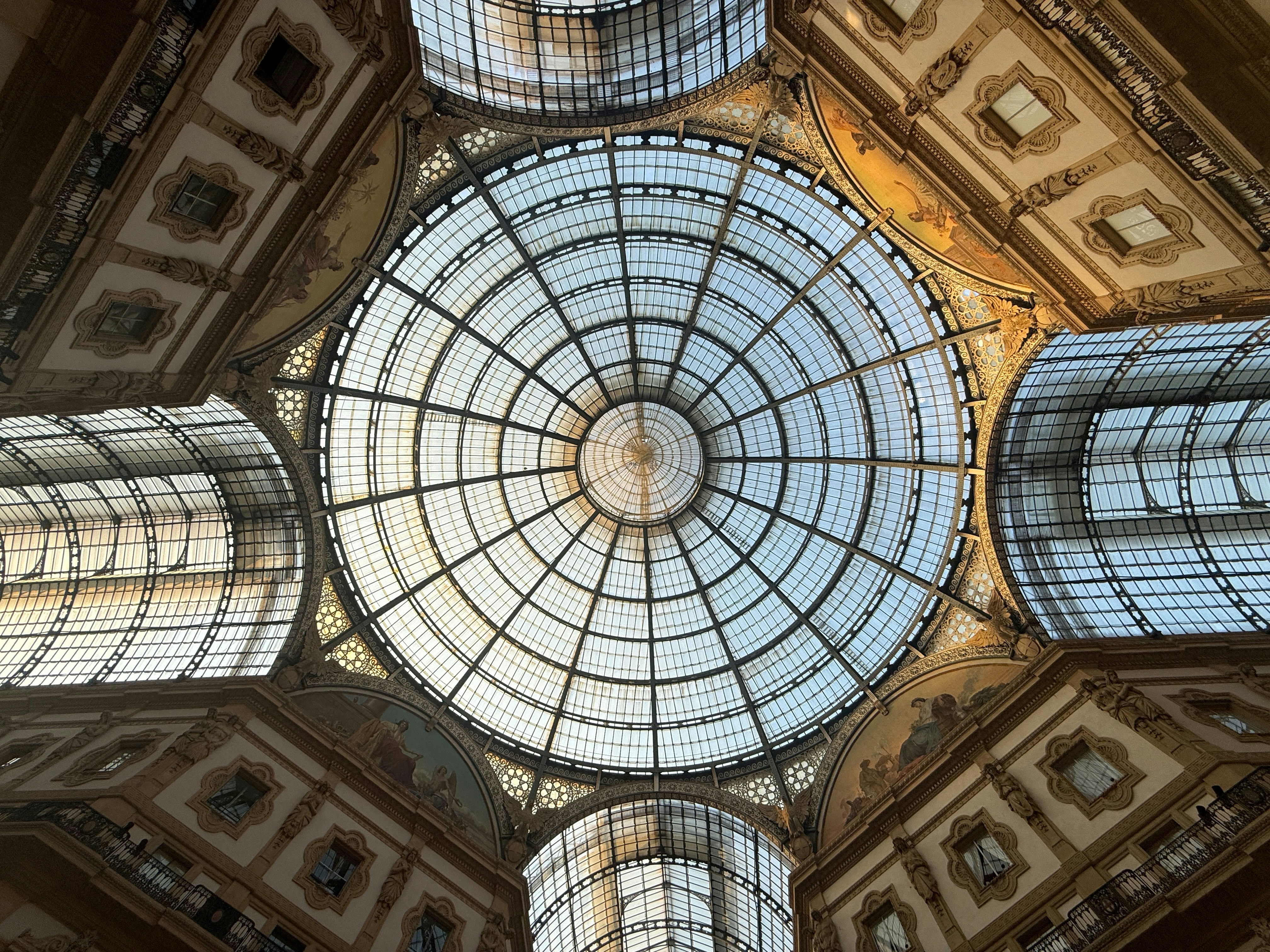 Geometric Glass—A Circular Glass Dome Framed by Classical Archways