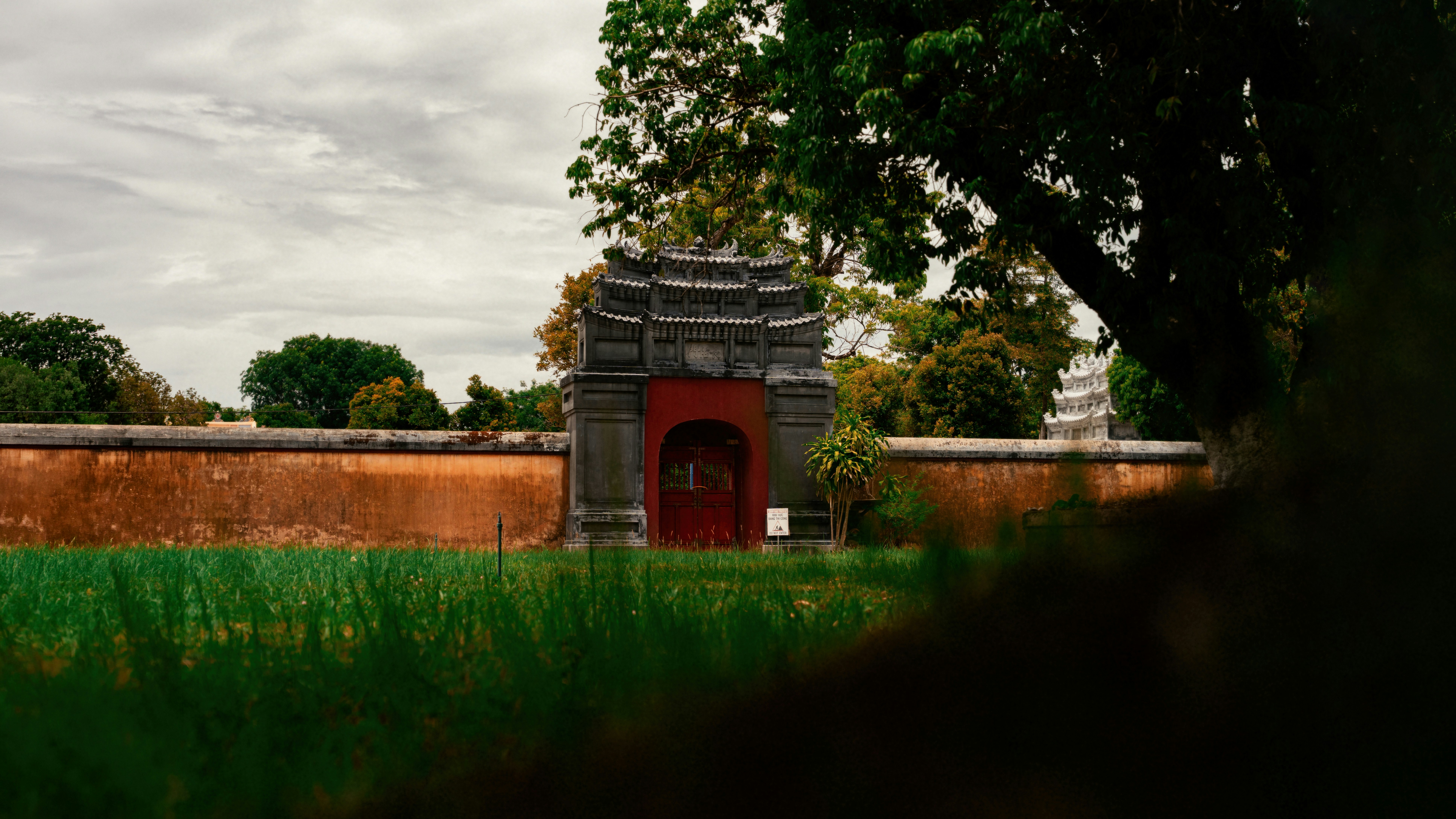 Red Gate and Ancient Wall: Quiet Entrance into a Garden of Stone