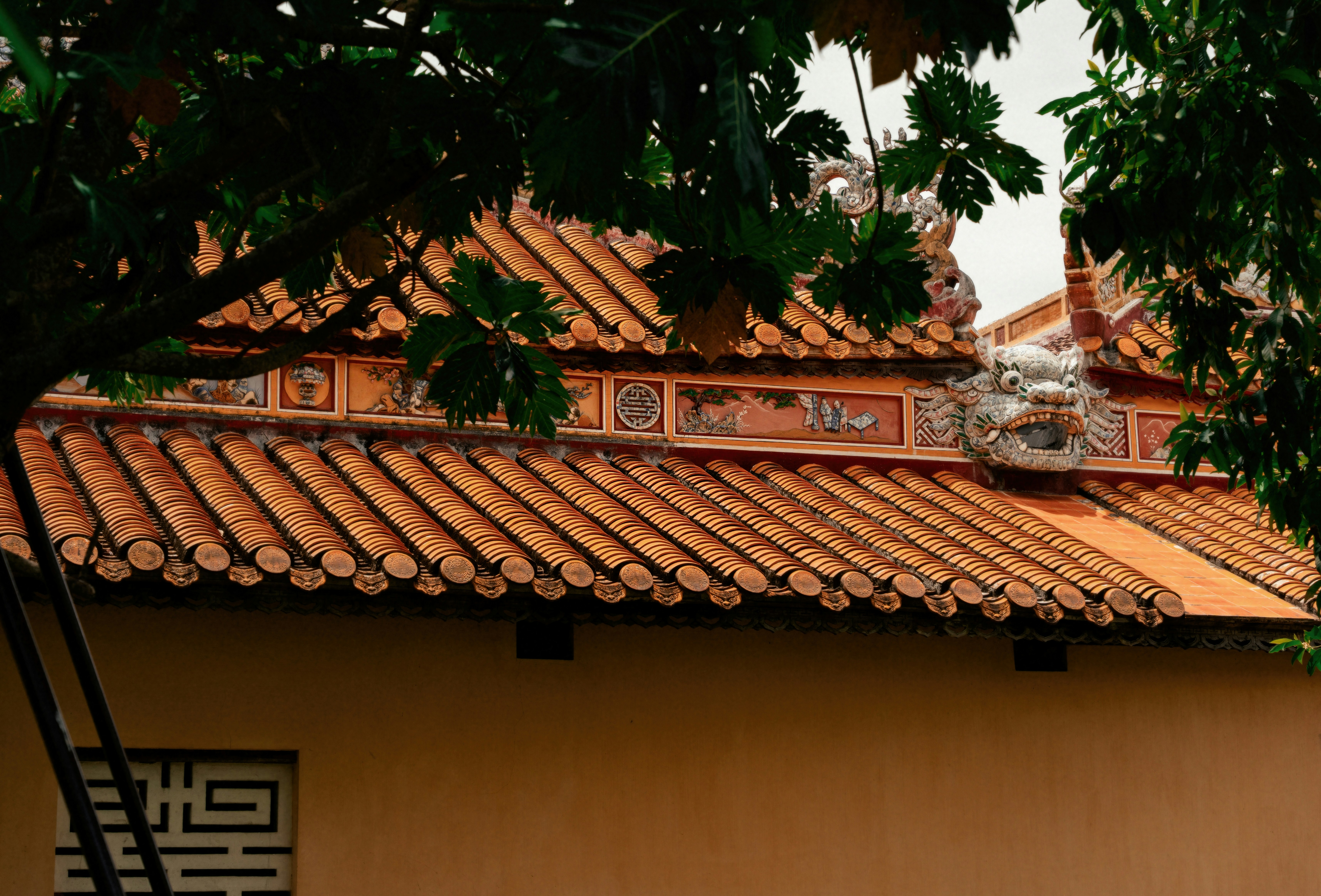Clay-Tiled Roofline Meets Dragon Crest