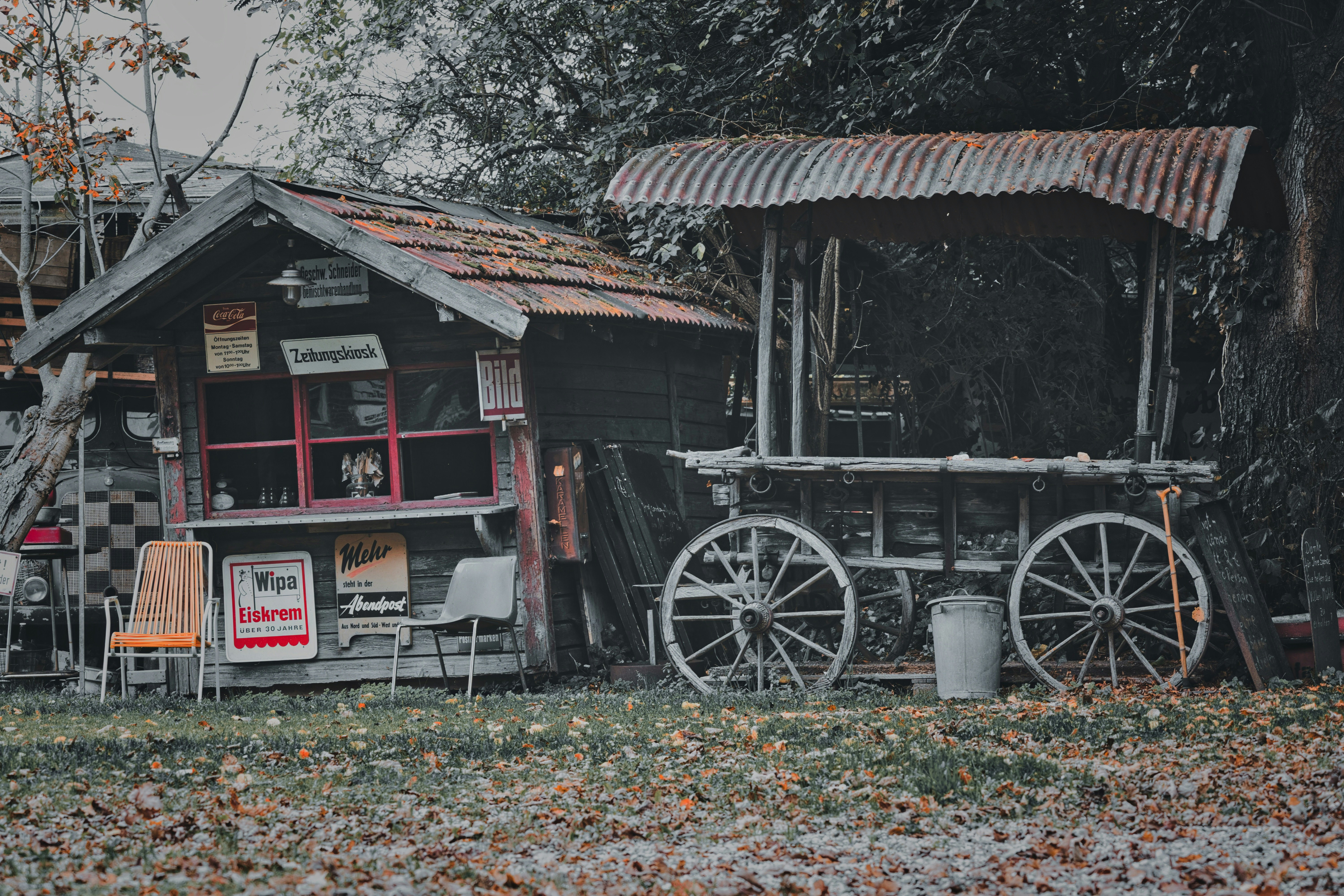 Old Cart, Worn Shopfront, and Autumn Ground