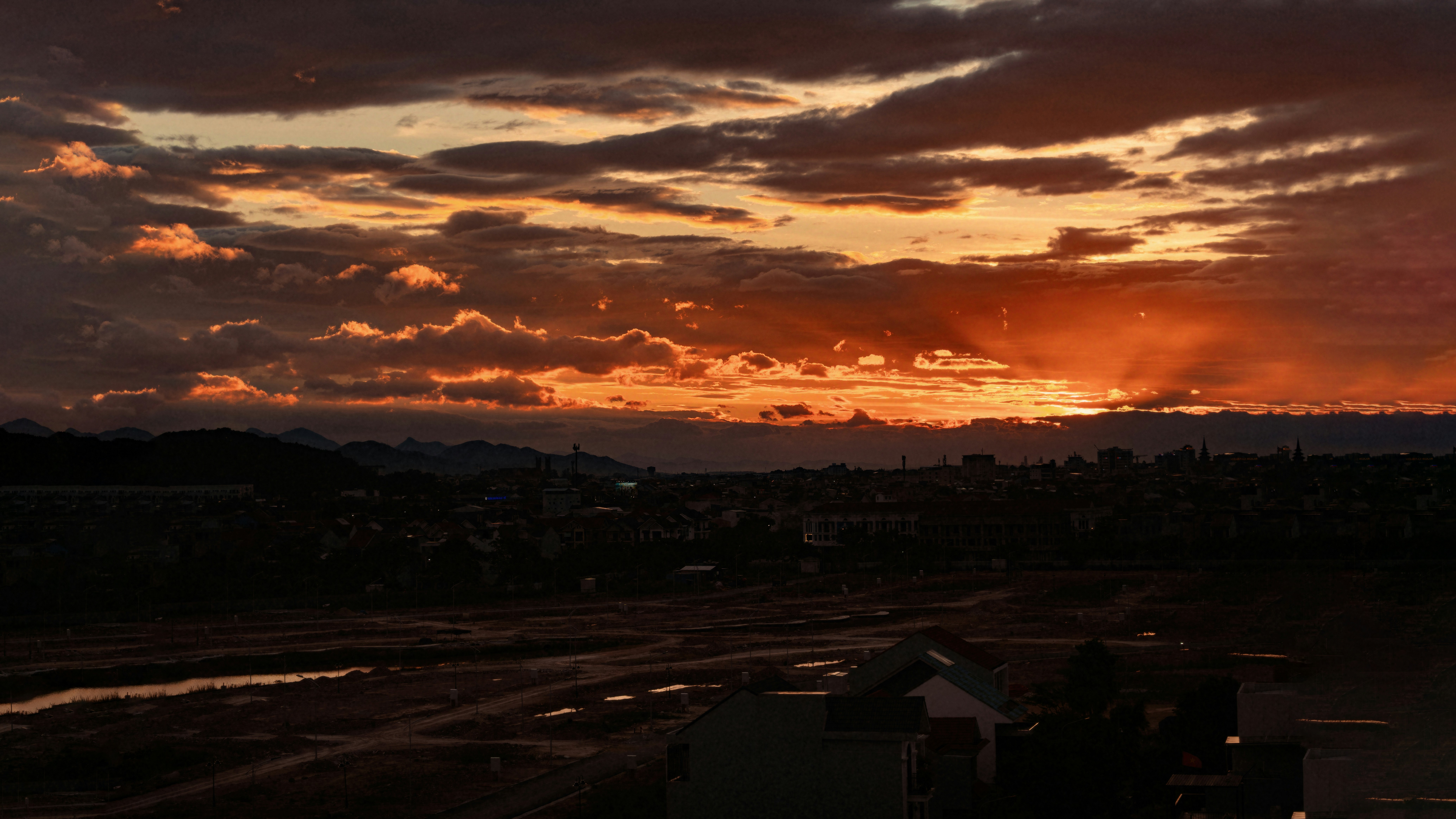 Crimson Horizon: Dusk Over a Quiet Valley