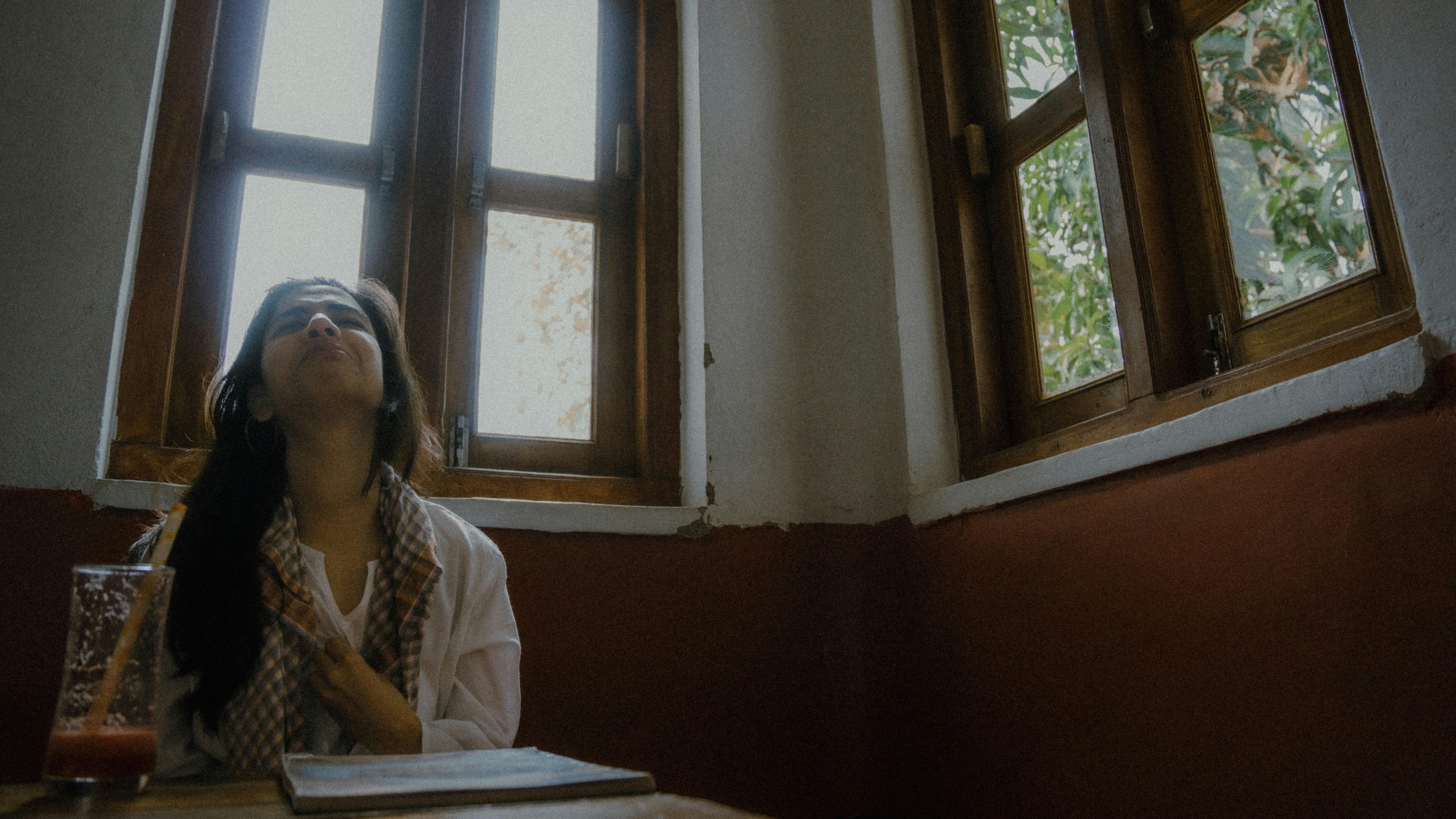 Rays through the Window: A Quiet Moment of Prayer and Sips