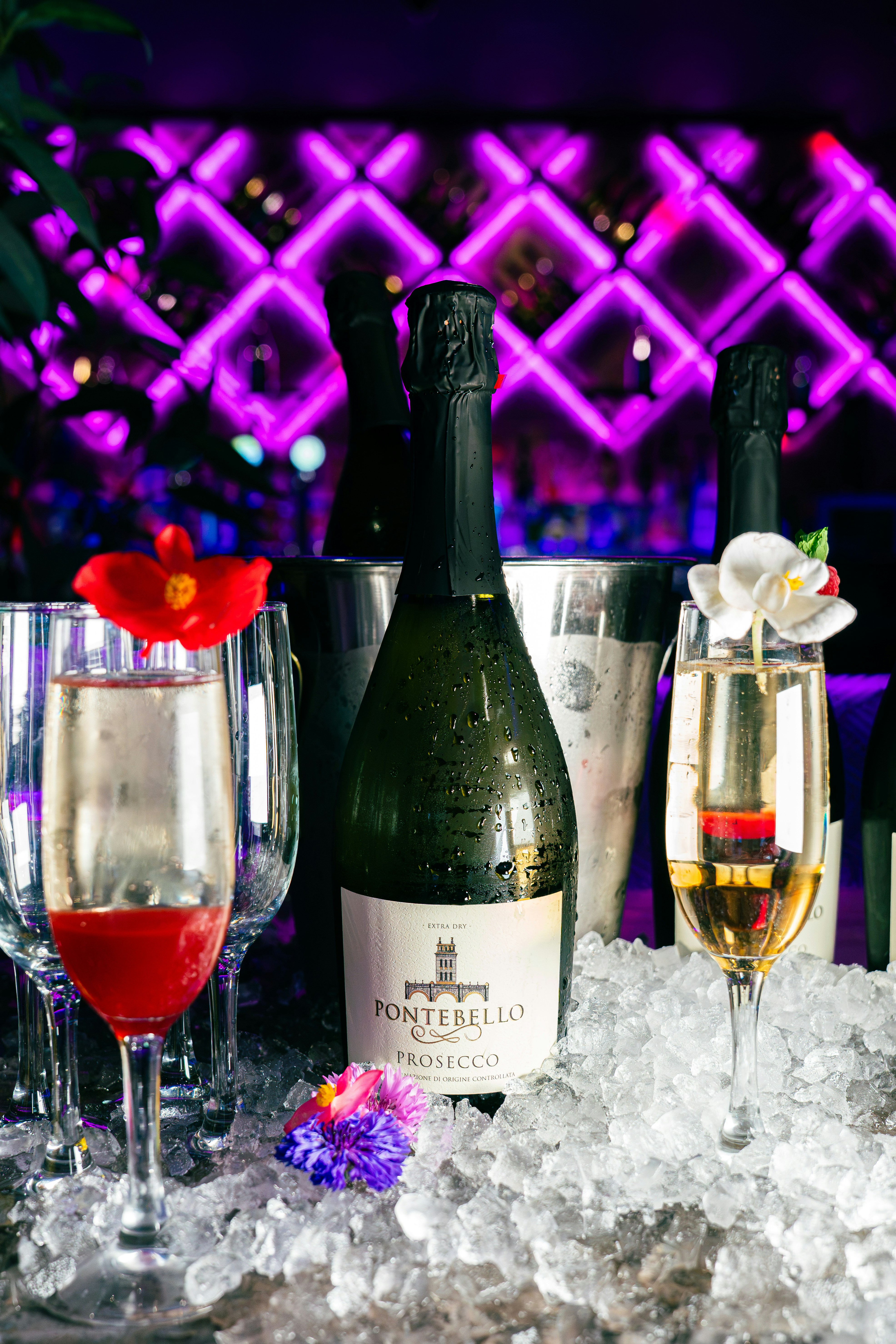 Midnight Bubbles: Prosecco Glow Among Neon Diamonds