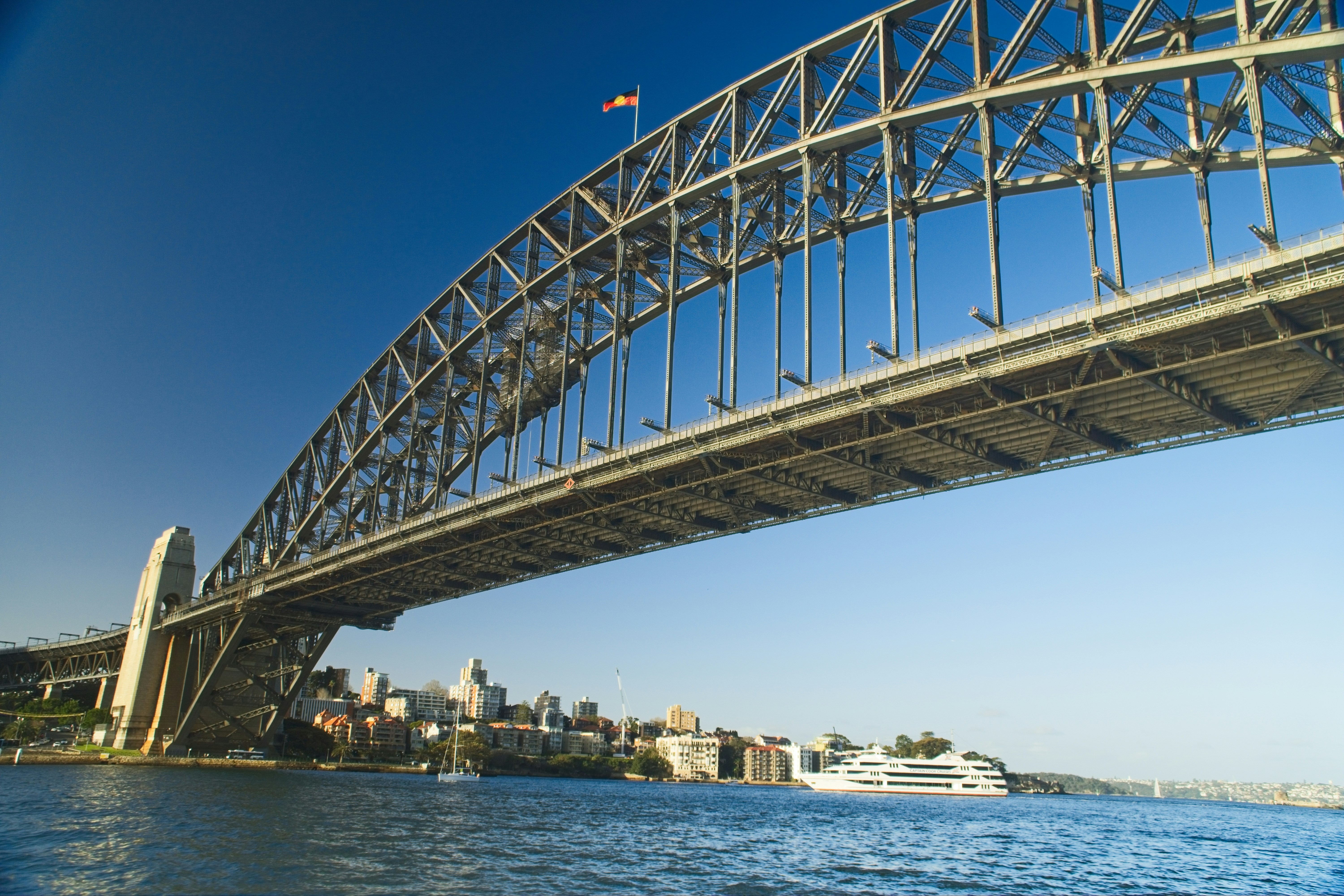Arc of Steel: A Low Tide Under the Harbour Bridge