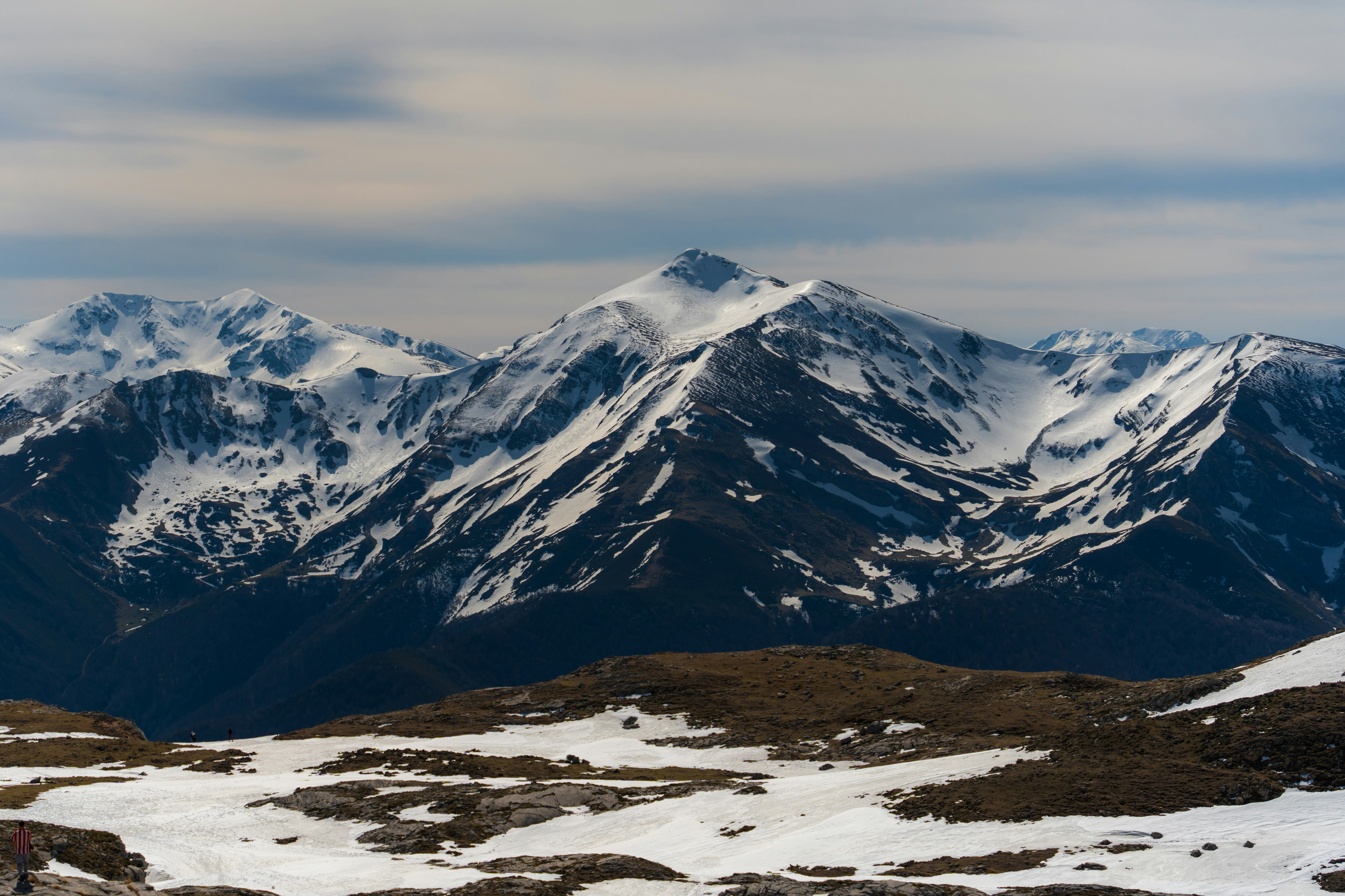 Snow-clad Ridge Under a Quiet Fjord Sky