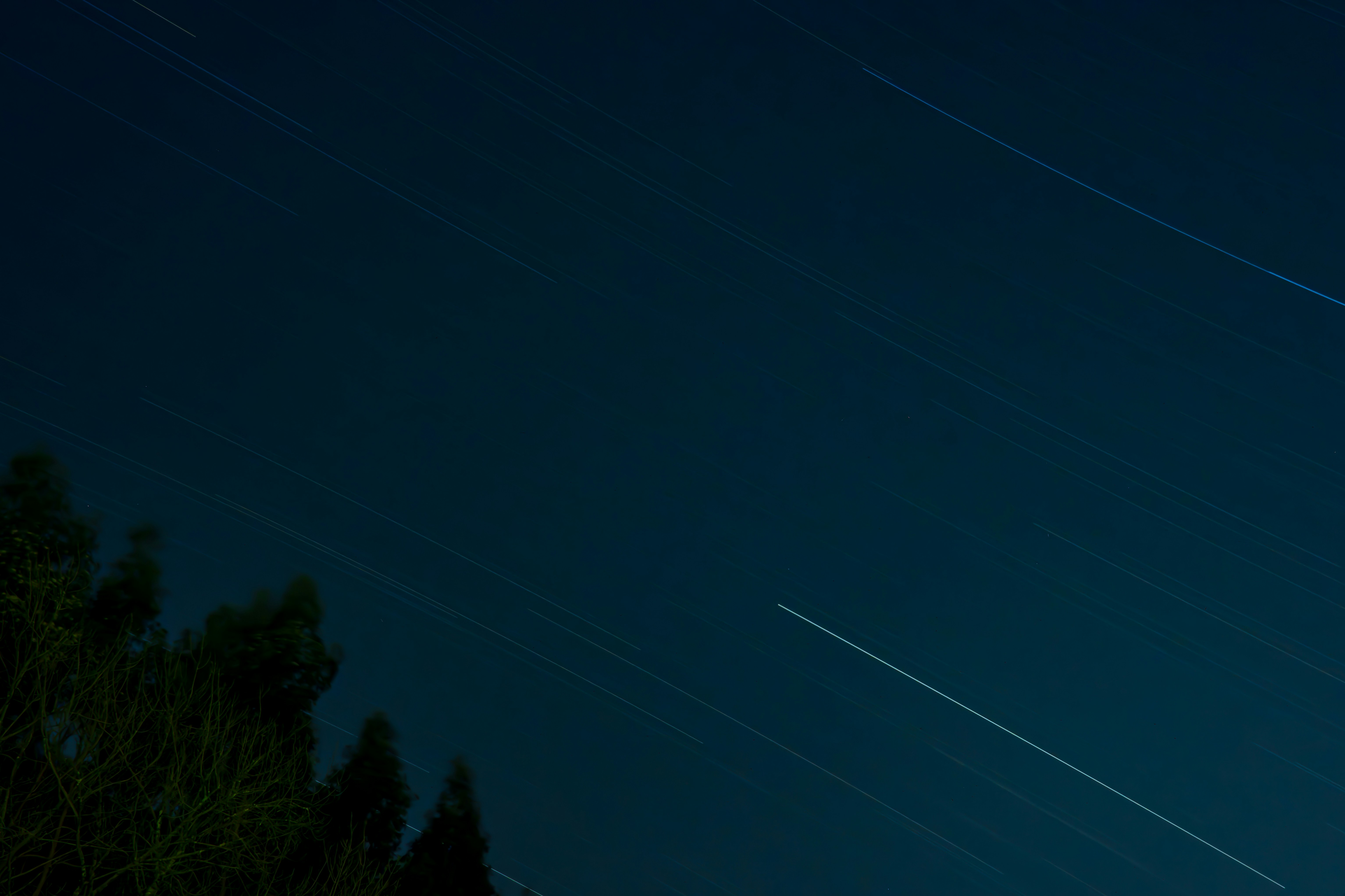 Streaks Across a Quiet Night Sky