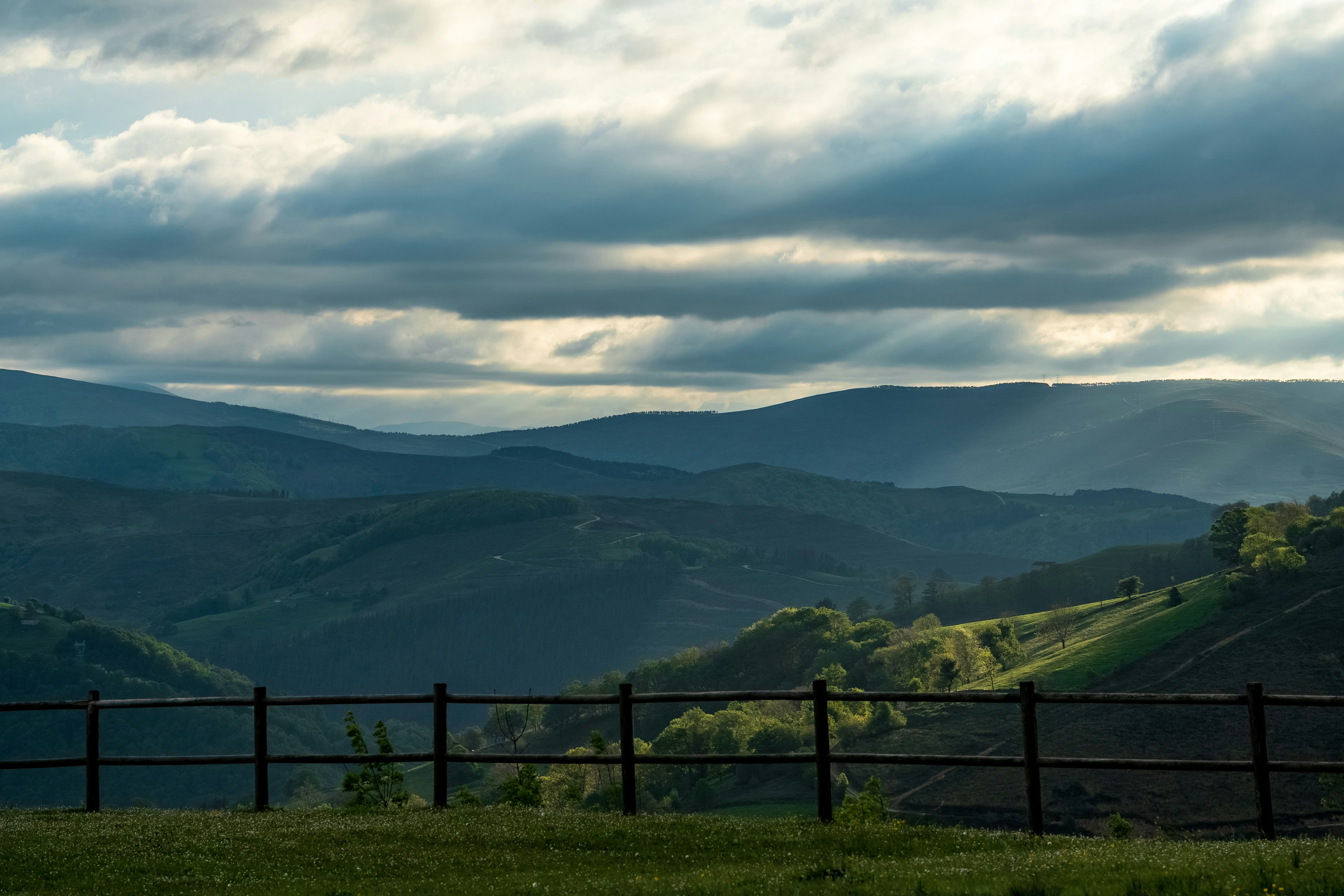 Layered Hills Under Dusky Skies