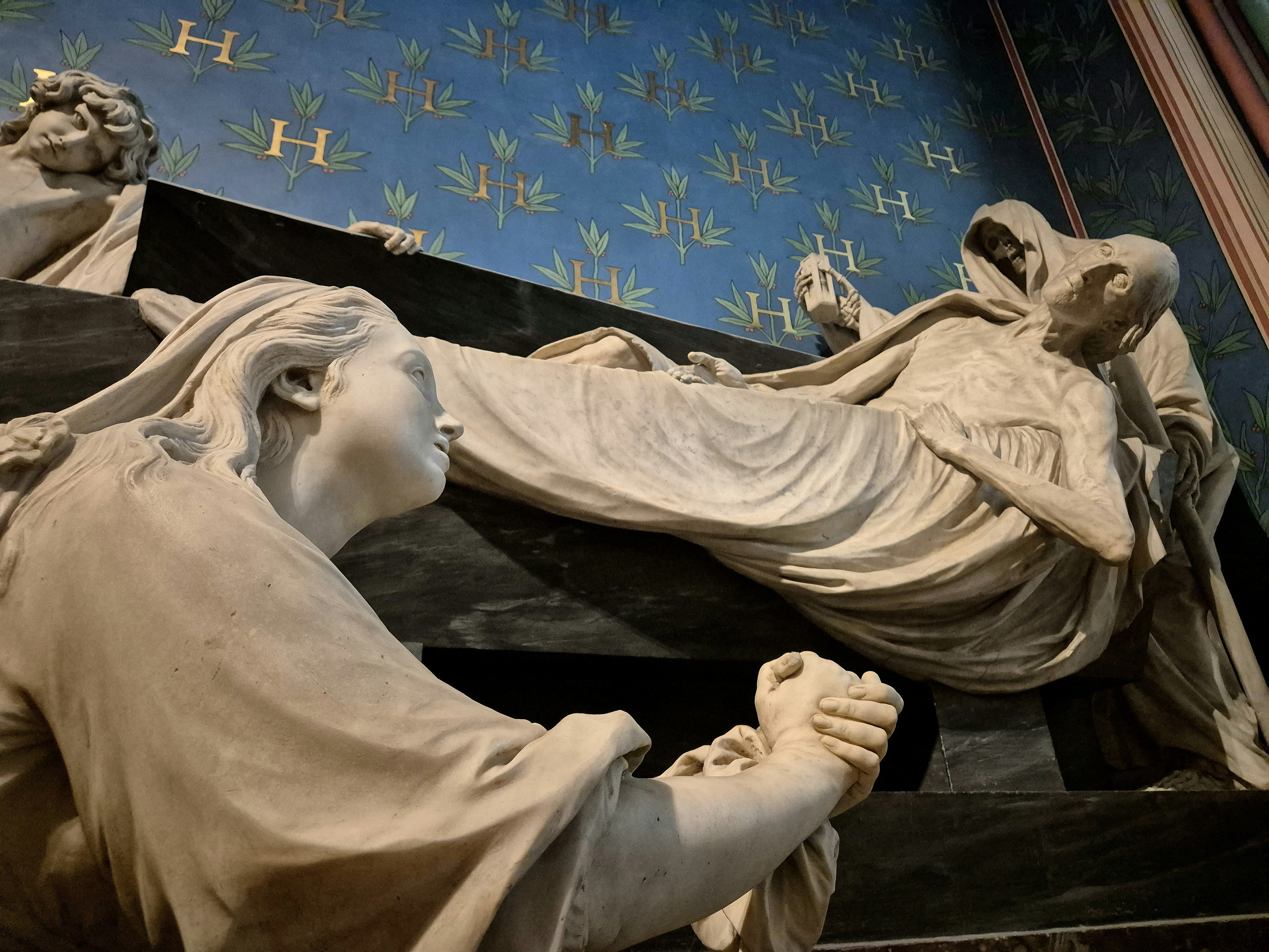 Whispering Figures in Stone: A Silent Meeting
