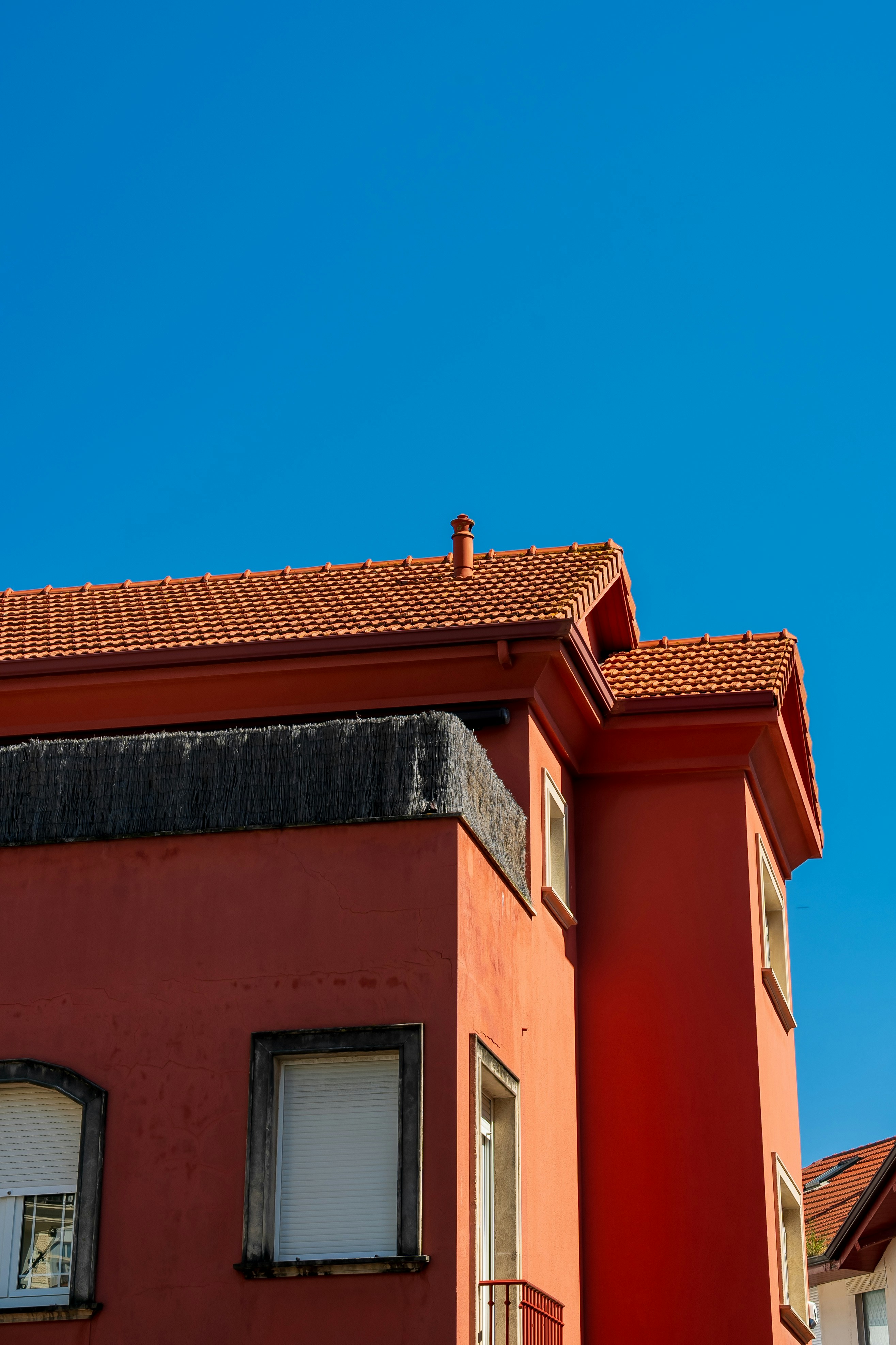 Terracotta Rooftops Under a Clear Blue Sky