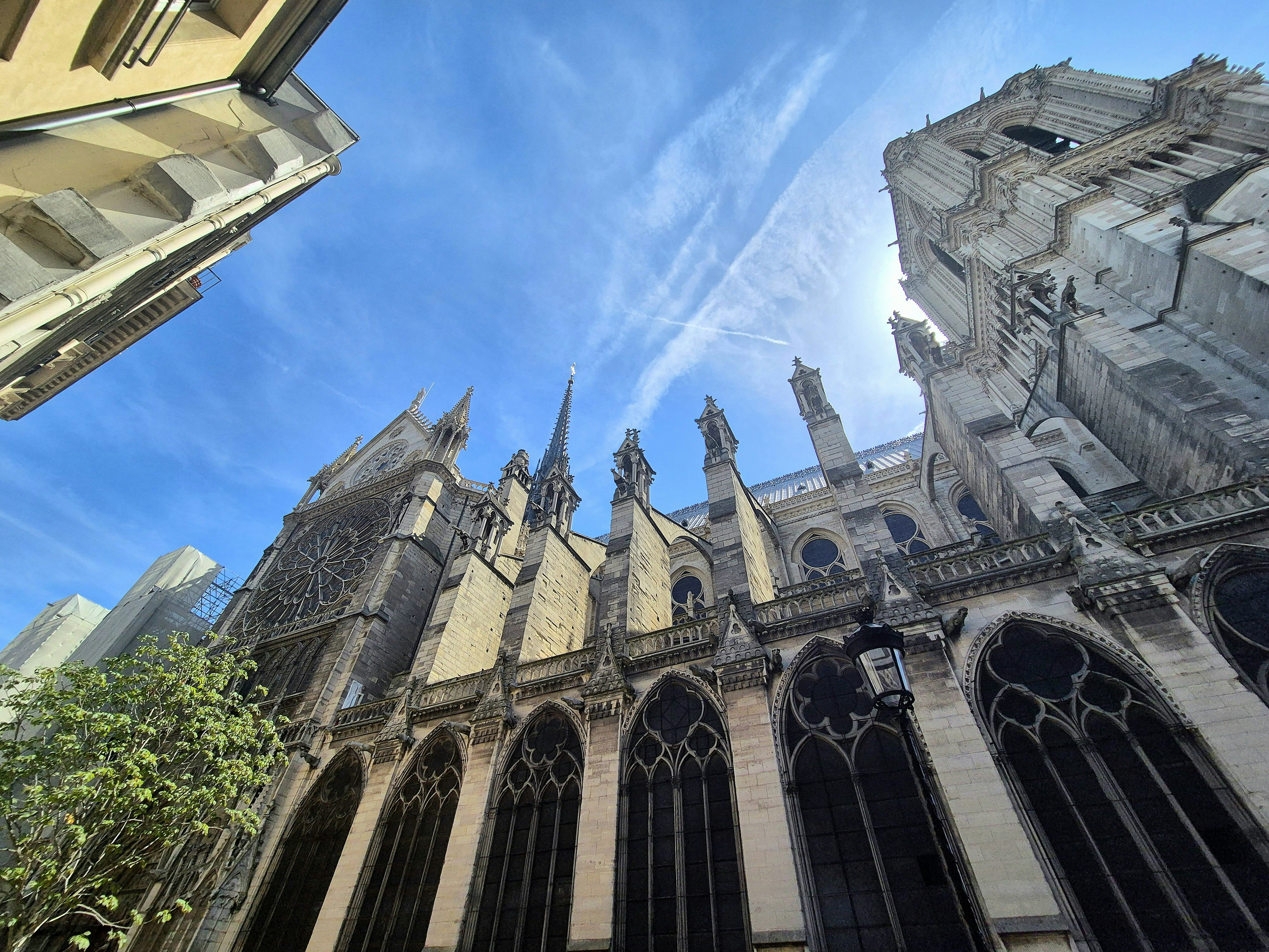 Gothic Skyline: Cathedral Facade Reaching Toward a Bright Sky