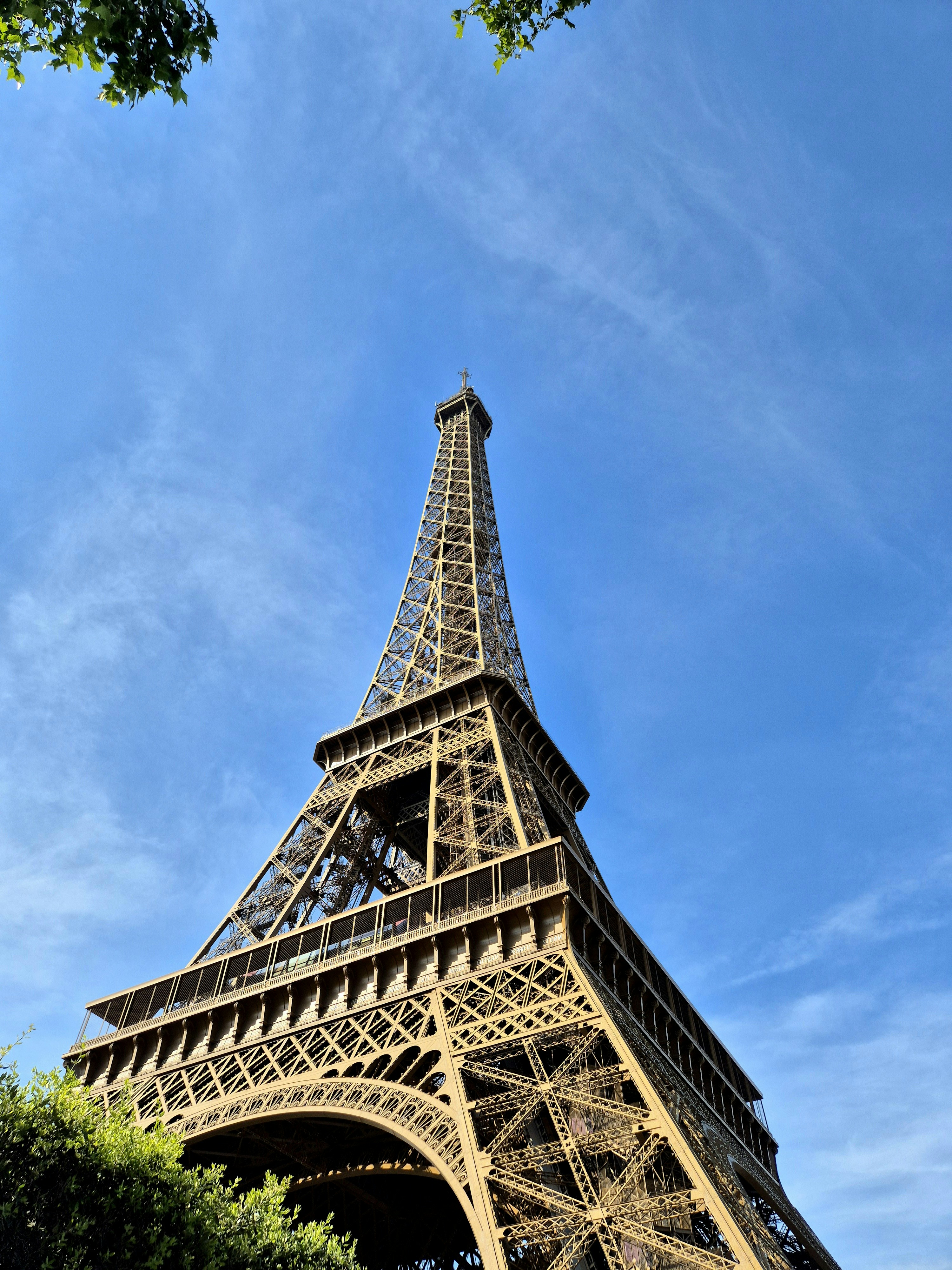 Skyward Iron: The Eiffel Tower Reaches into a Cerulean Day