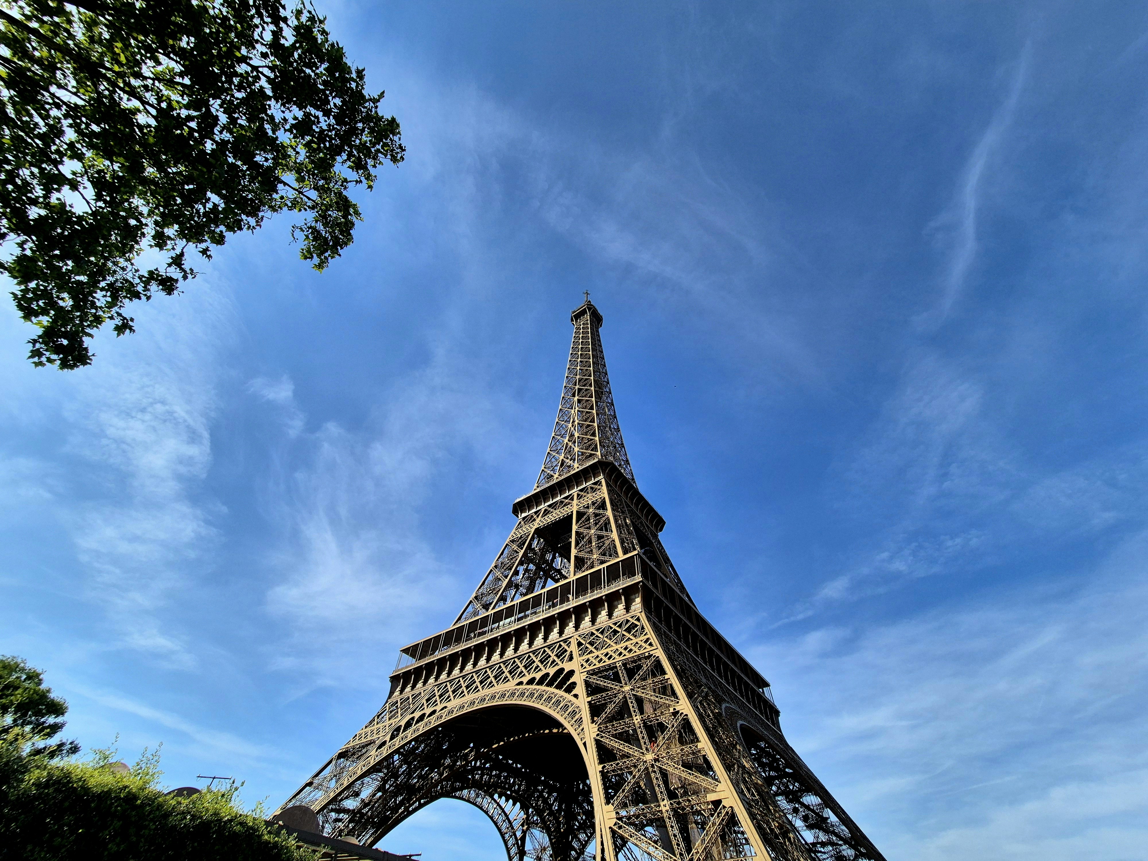 Gotham of Iron: Eiffel Tower Piercing a Clear Paris Sky