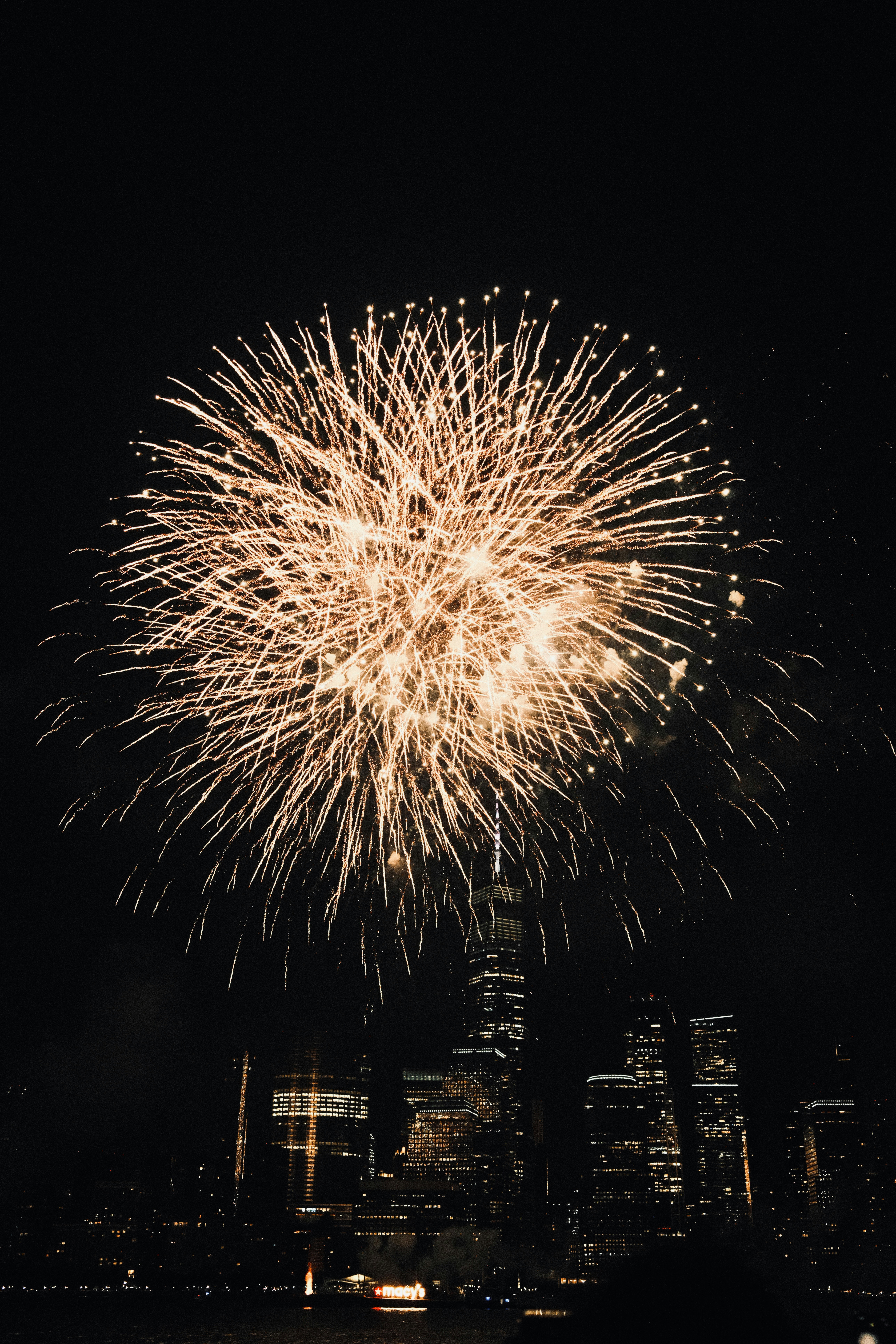 Skyborne Burst Over the City: Nightscape Fireworks Above the Skyline