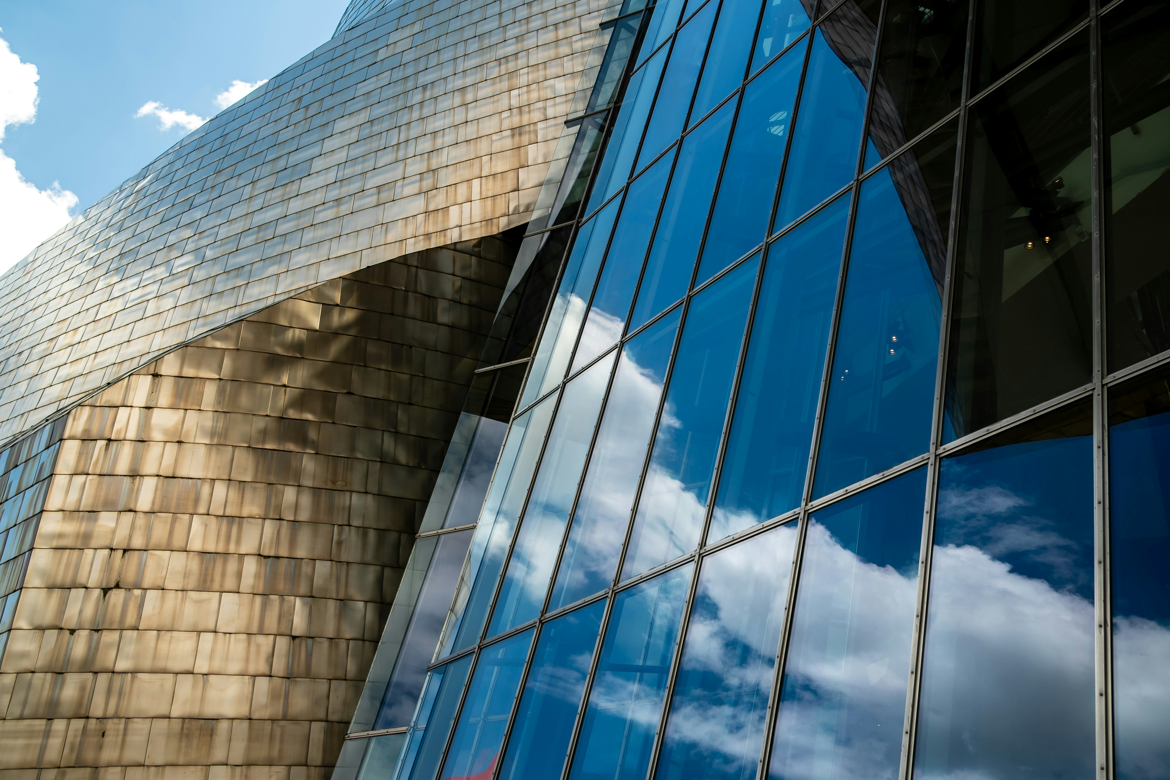 Glass Facade Reflections: Geometry of Sky and Steel