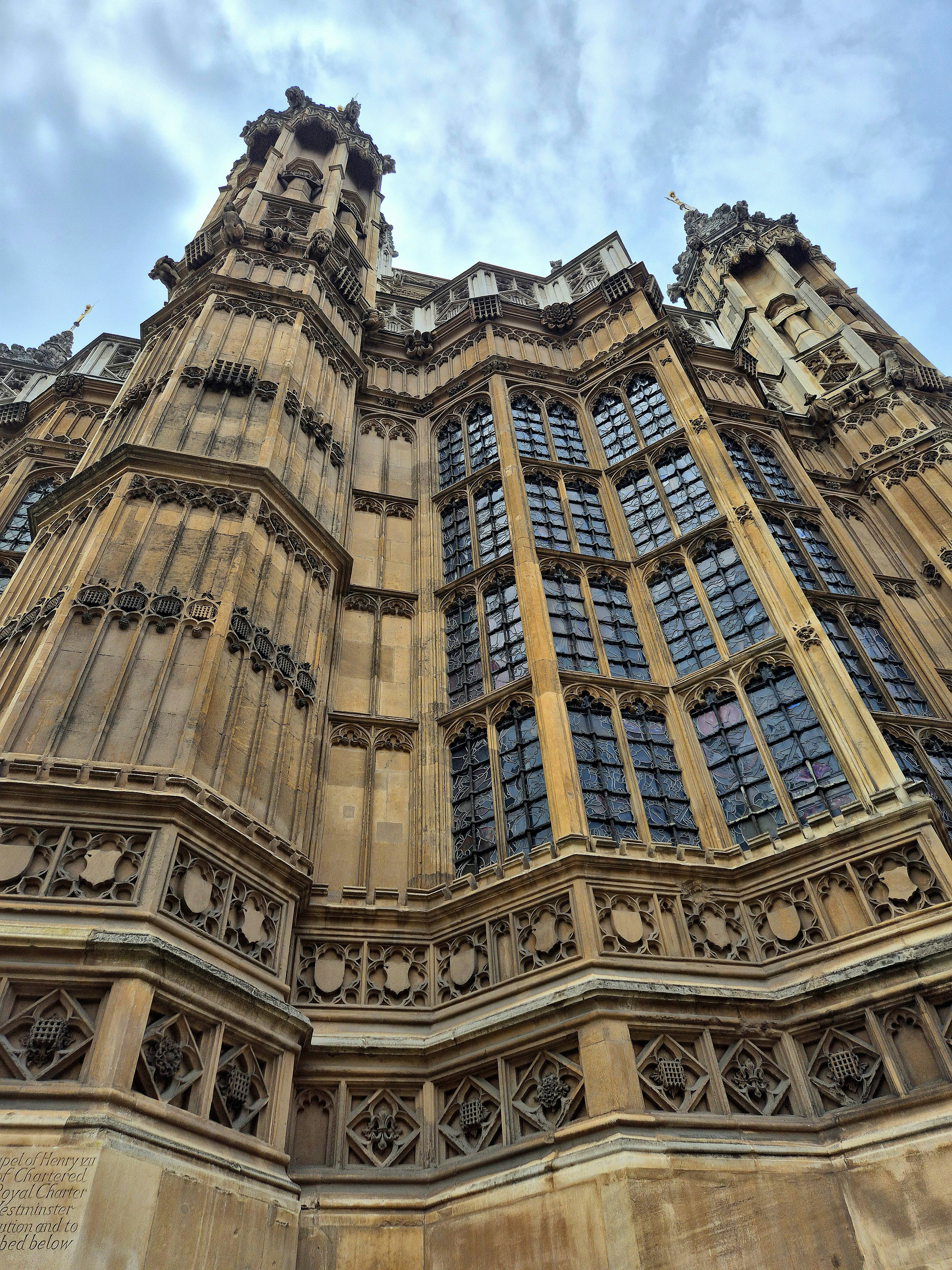 Gothic Facade, Leaning Towers: Upward View of a European Cathedral Corner