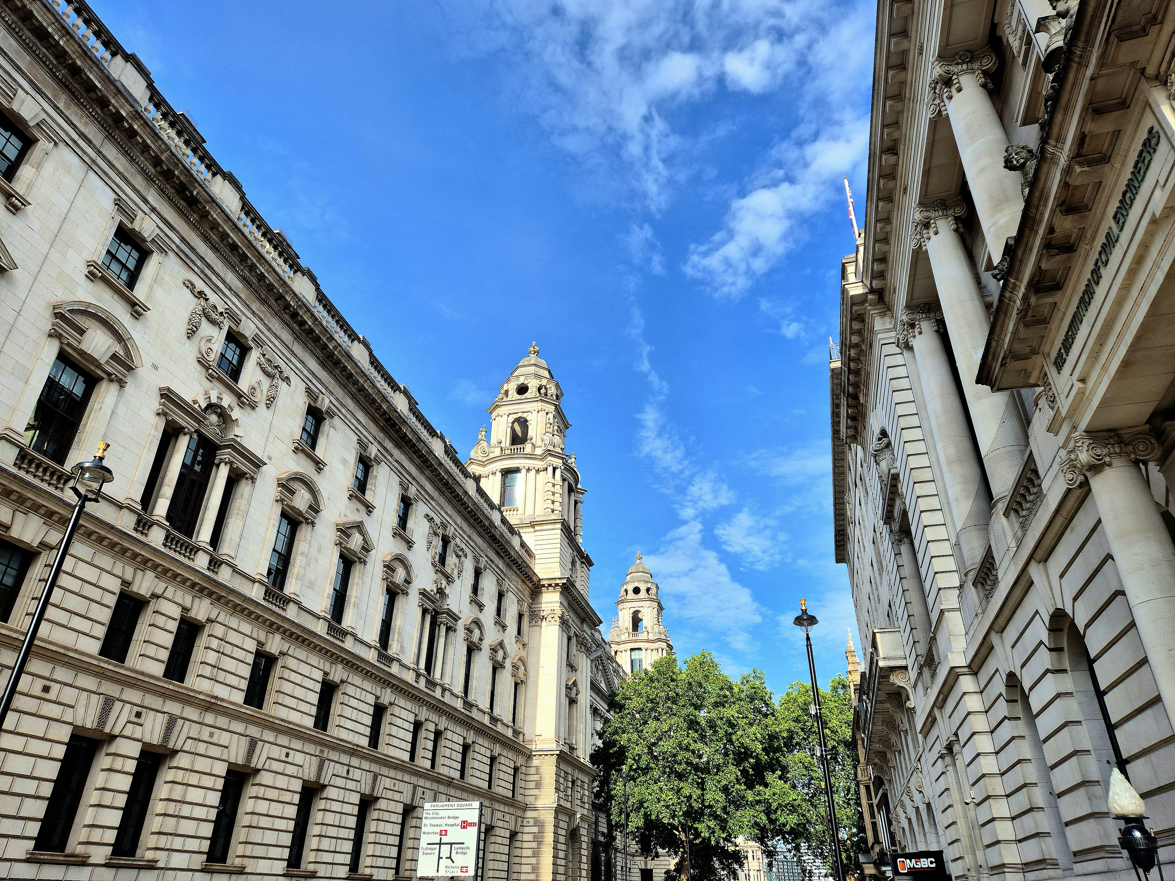 City Façade Converging to a Skyward Clock
