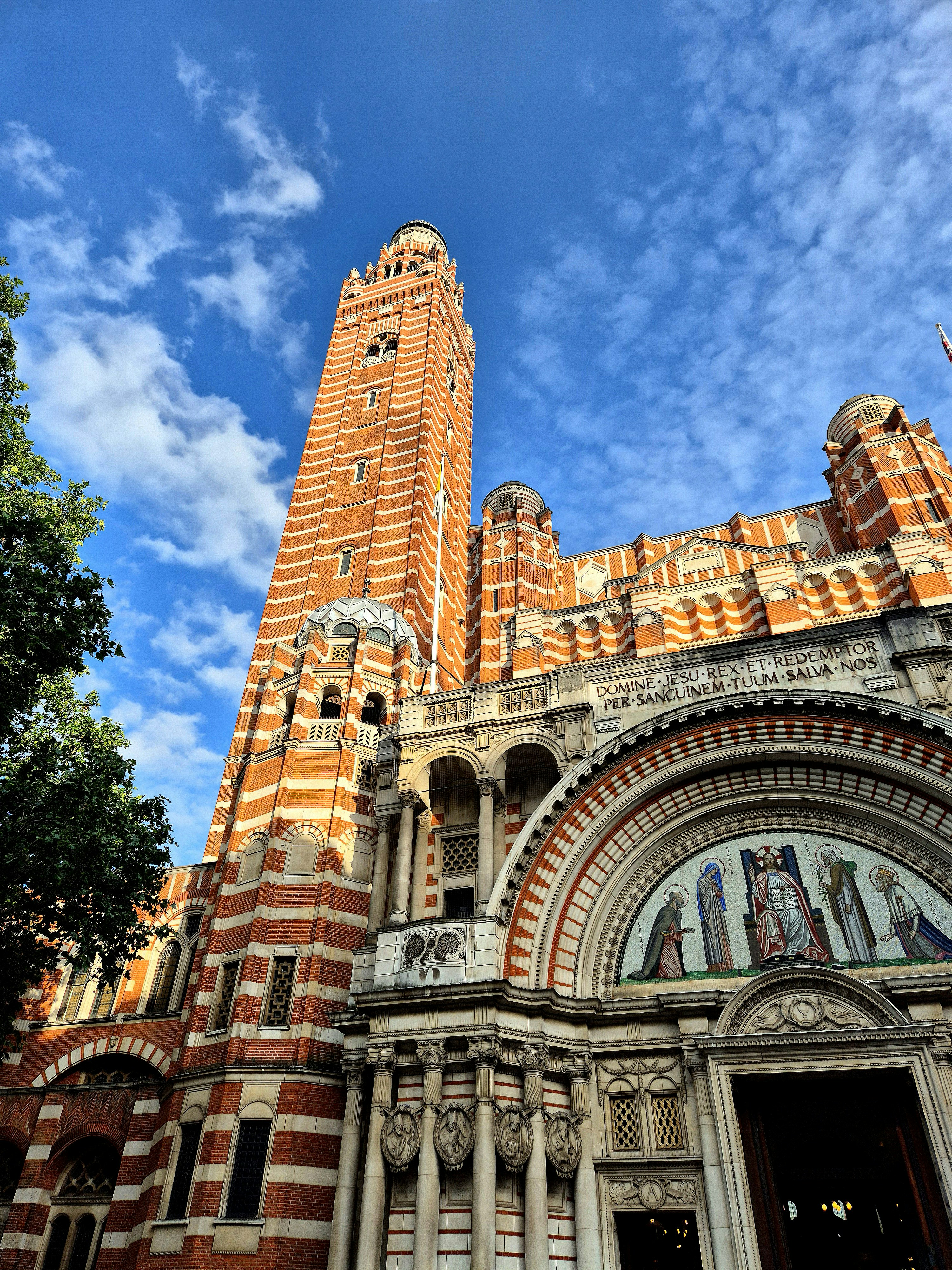 Crowning Bell Towers: A Gothic-Red Brick Cathedral Reaching Toward the Sky