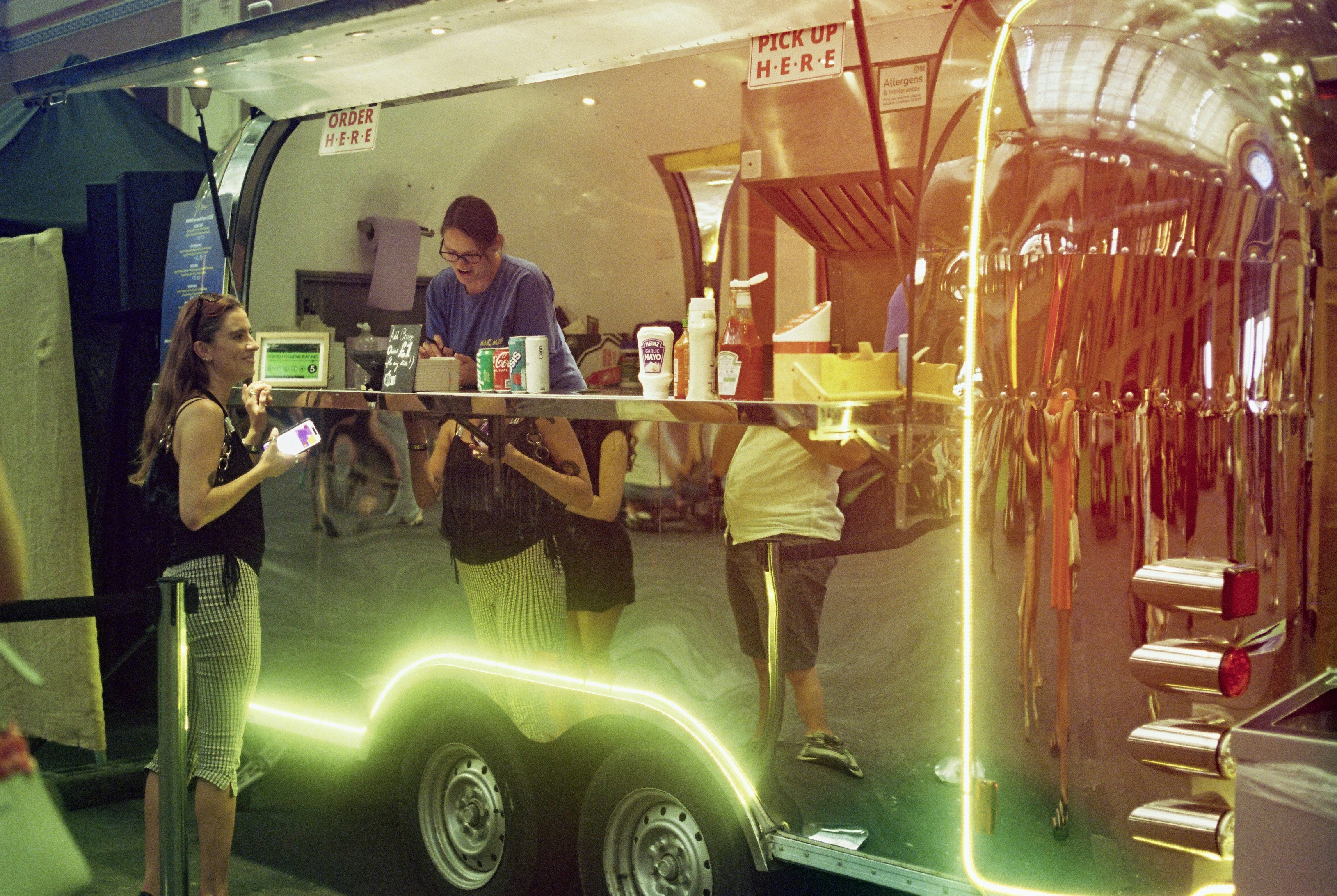 Neon-Trimmed Food Truck at Night Market