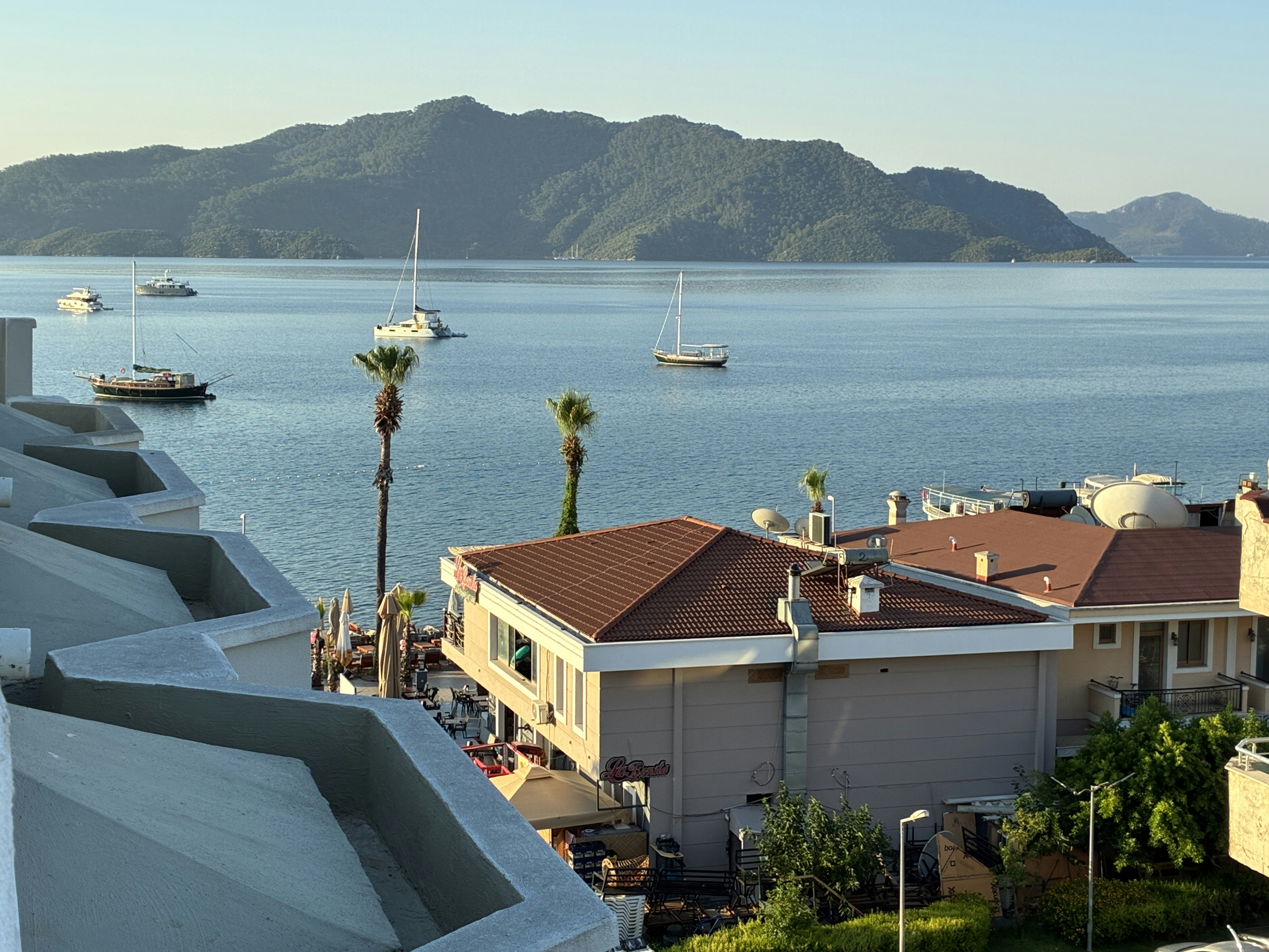 Coastal Terrace Vista Over Quiet Marina