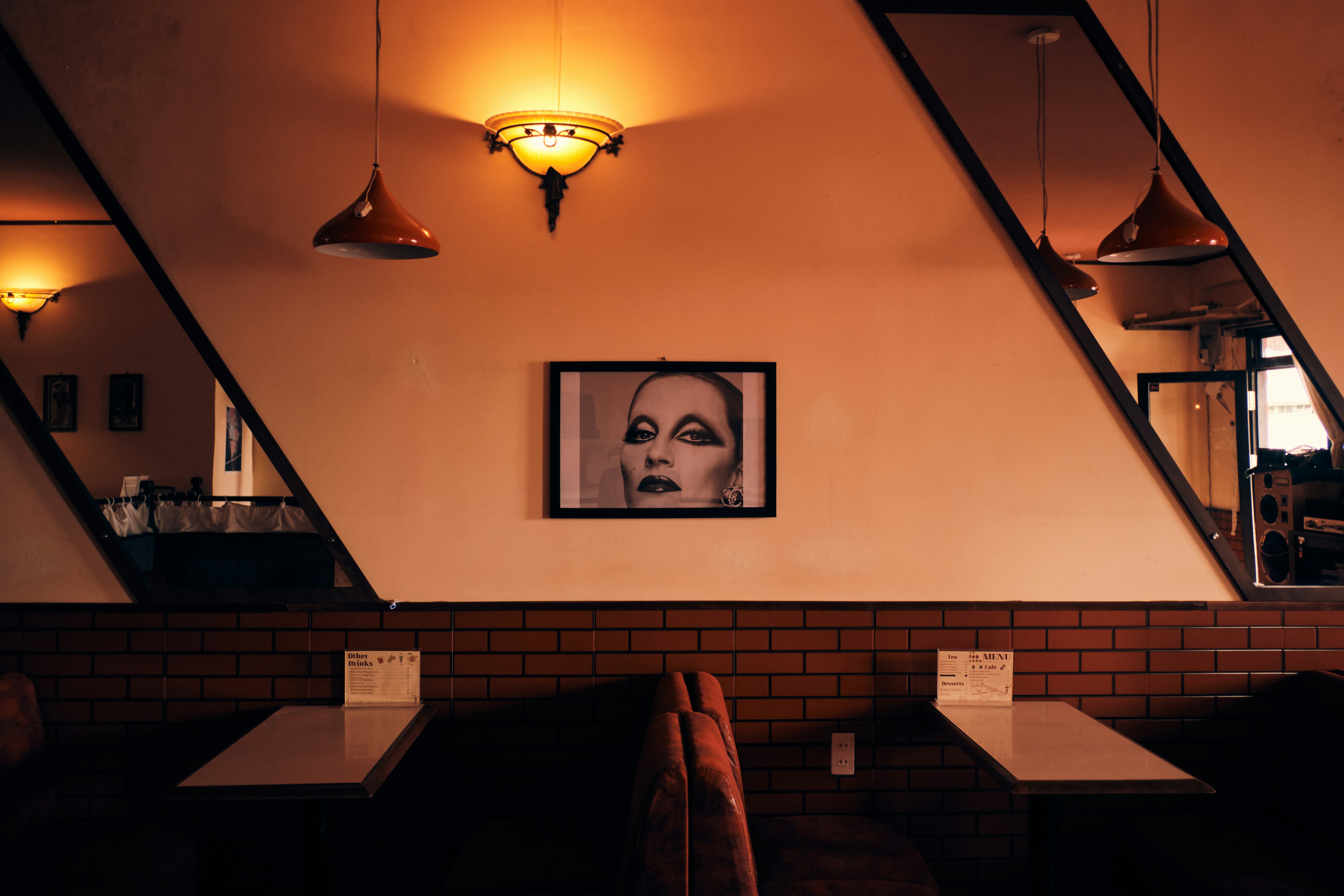 Ambient Portrait in a Dimly Lit Cafe Gallery