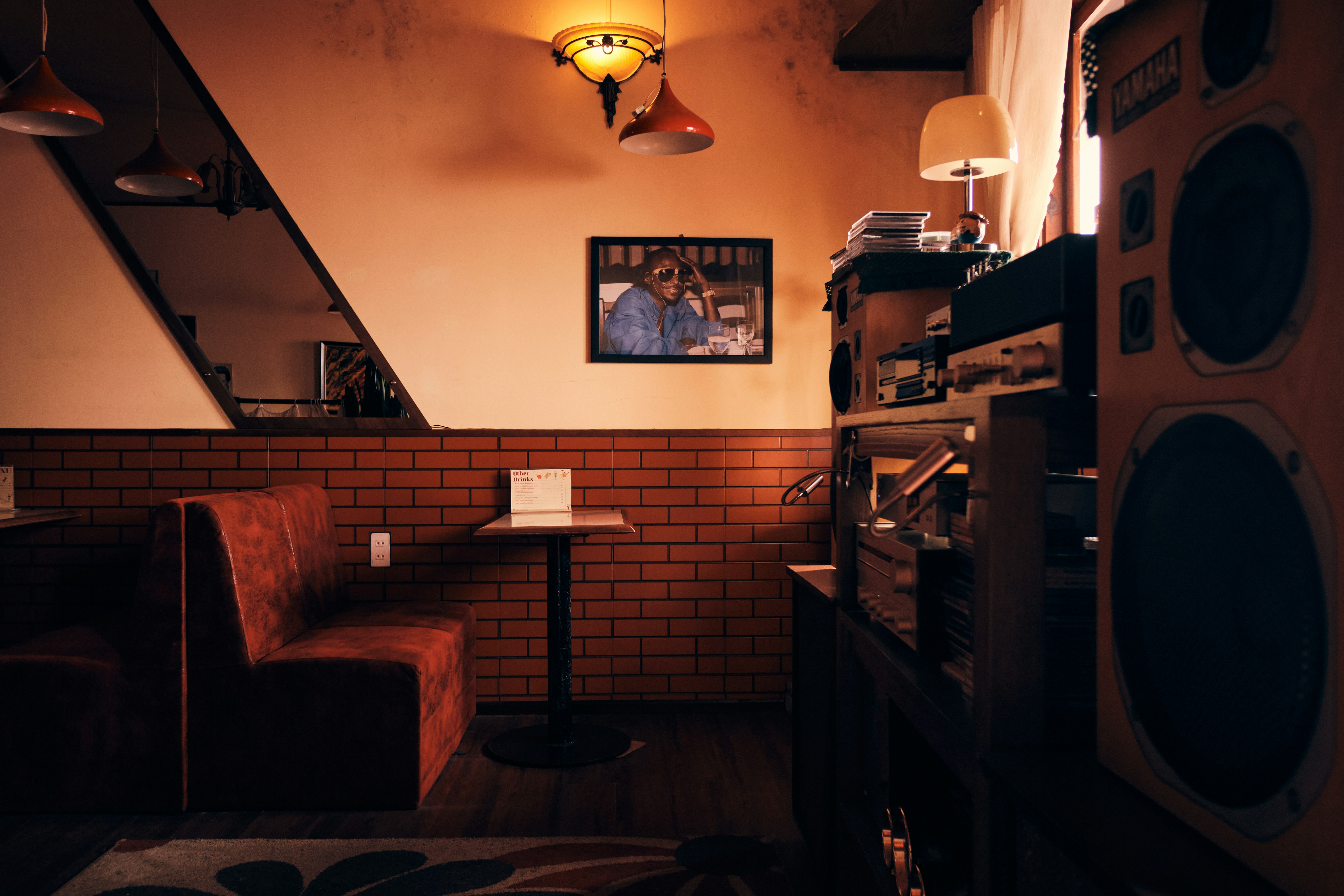Dimly Lit Lounge: Warm Hues and a Framed Moment