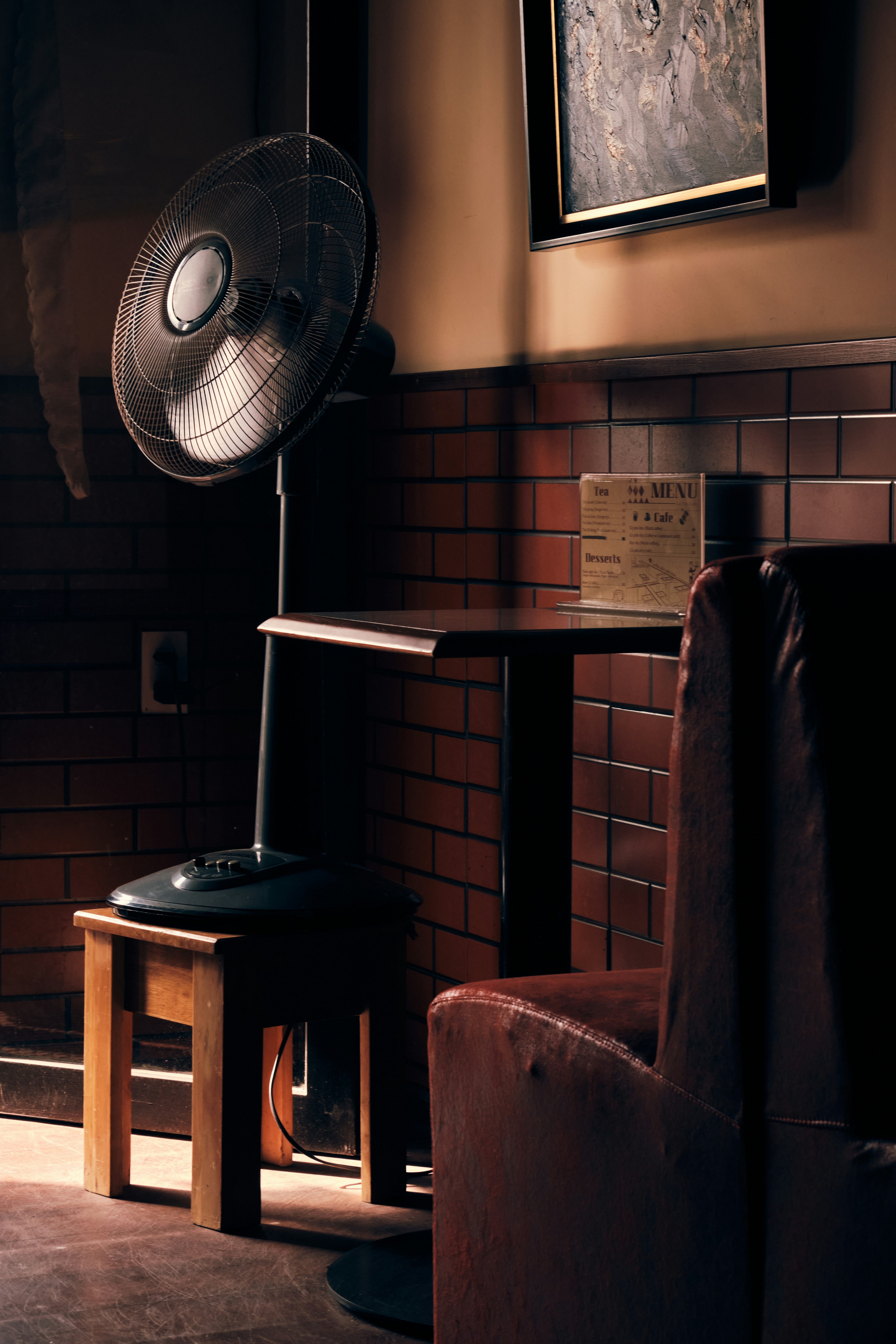 Midnight Lounge: A Vintage Corner with a Quiet Fan