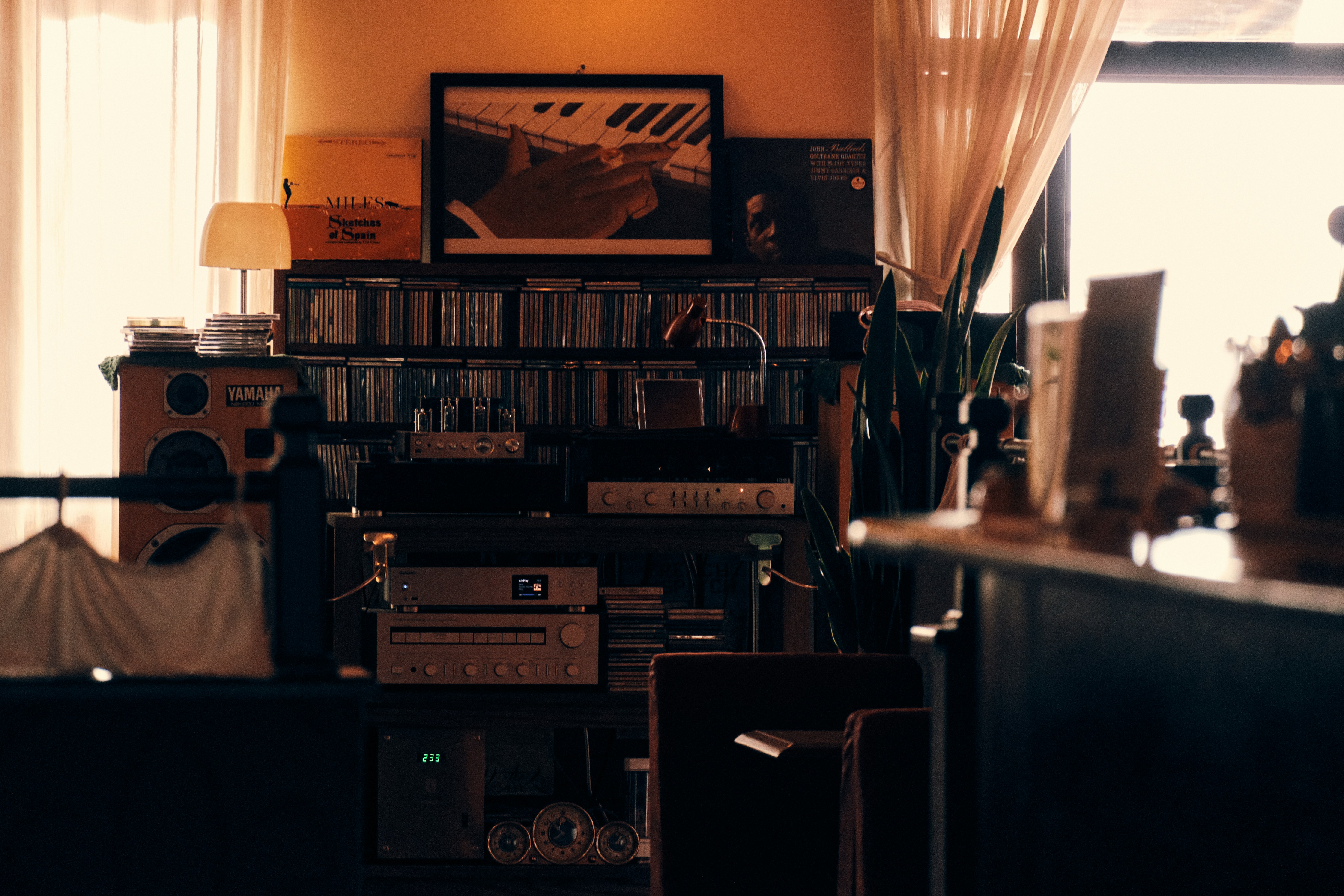 Dimly Lit Archive: A Cushioned Room of Analog Memories