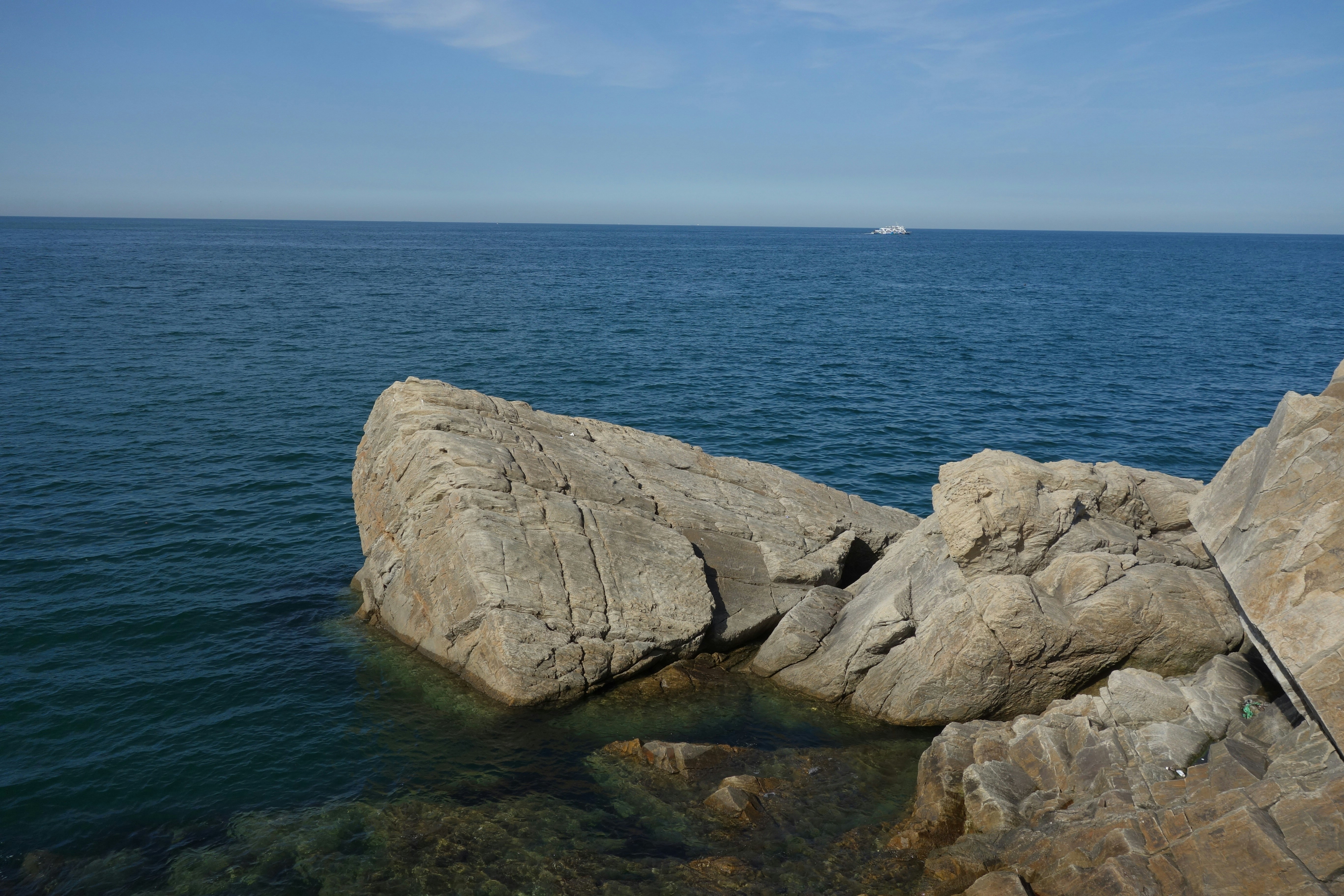 Coastal Granite: Quiet Rocks Meet the Sea Horizon