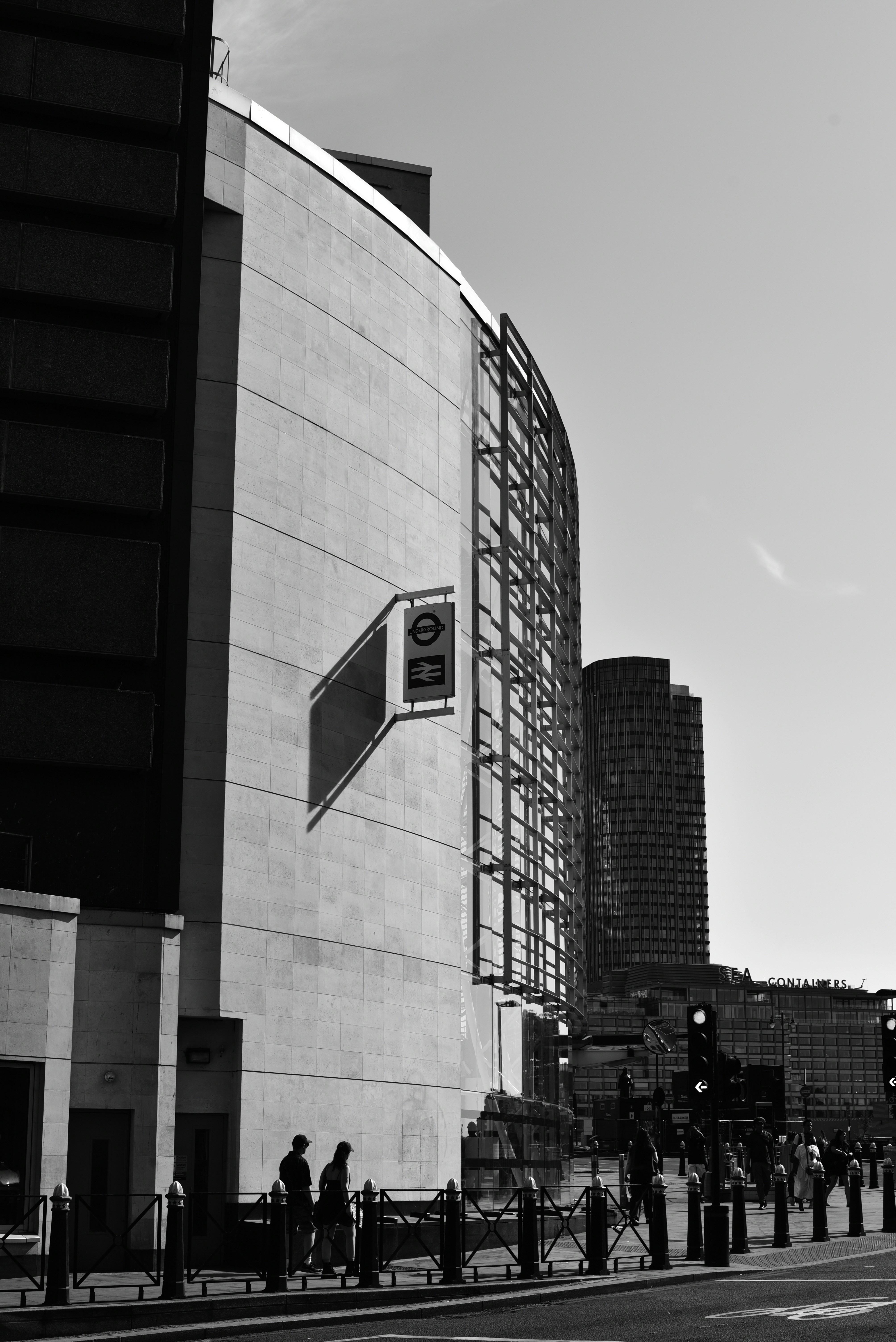 Shadowed Facades and Modern Curves at Dusk