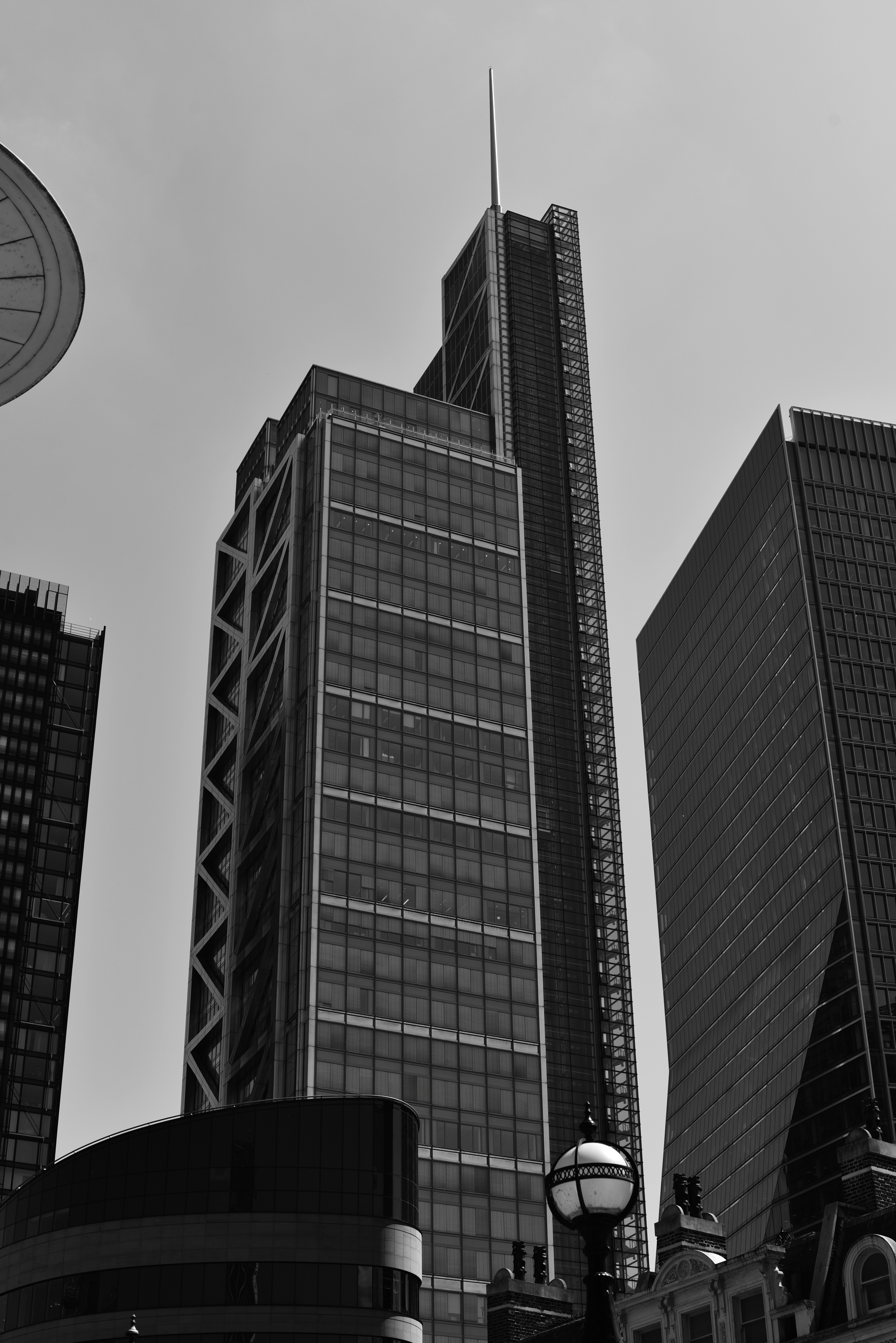 Skyward Arches: A Monochrome City Tower Scene