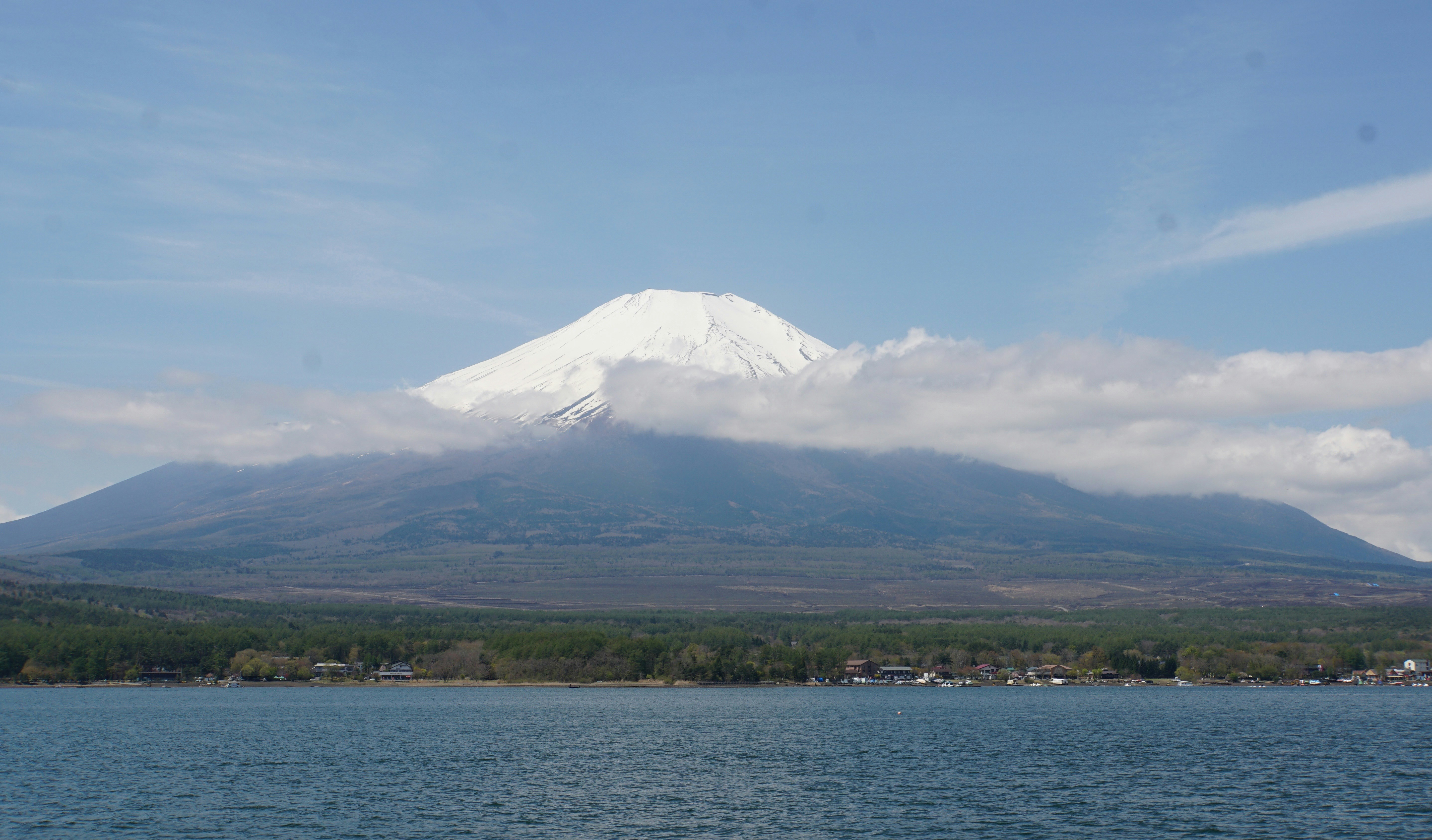 Snow-capped Peak Rising Above a Quiet Lake