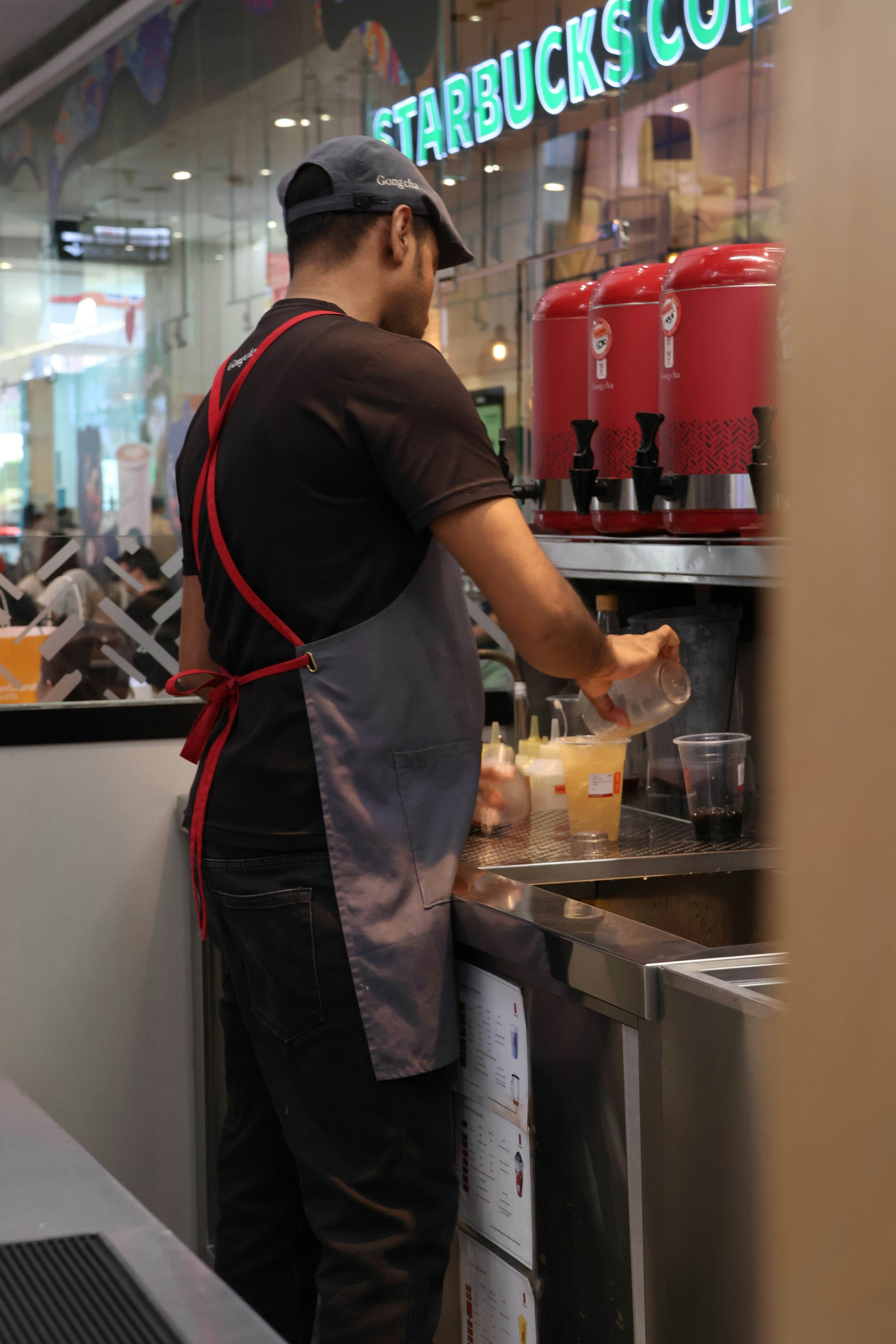 Barista at Work: Crafting Coffee Behind the Counter