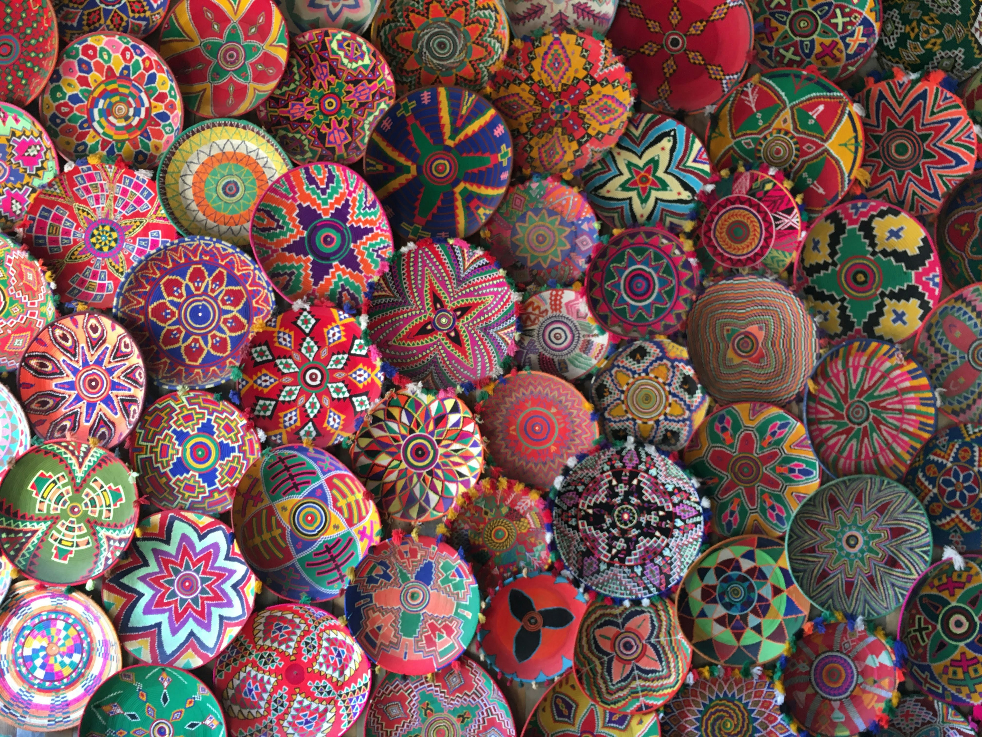 Vivid Orbs: A Tapestry of Hand-Painted Mandala Caps