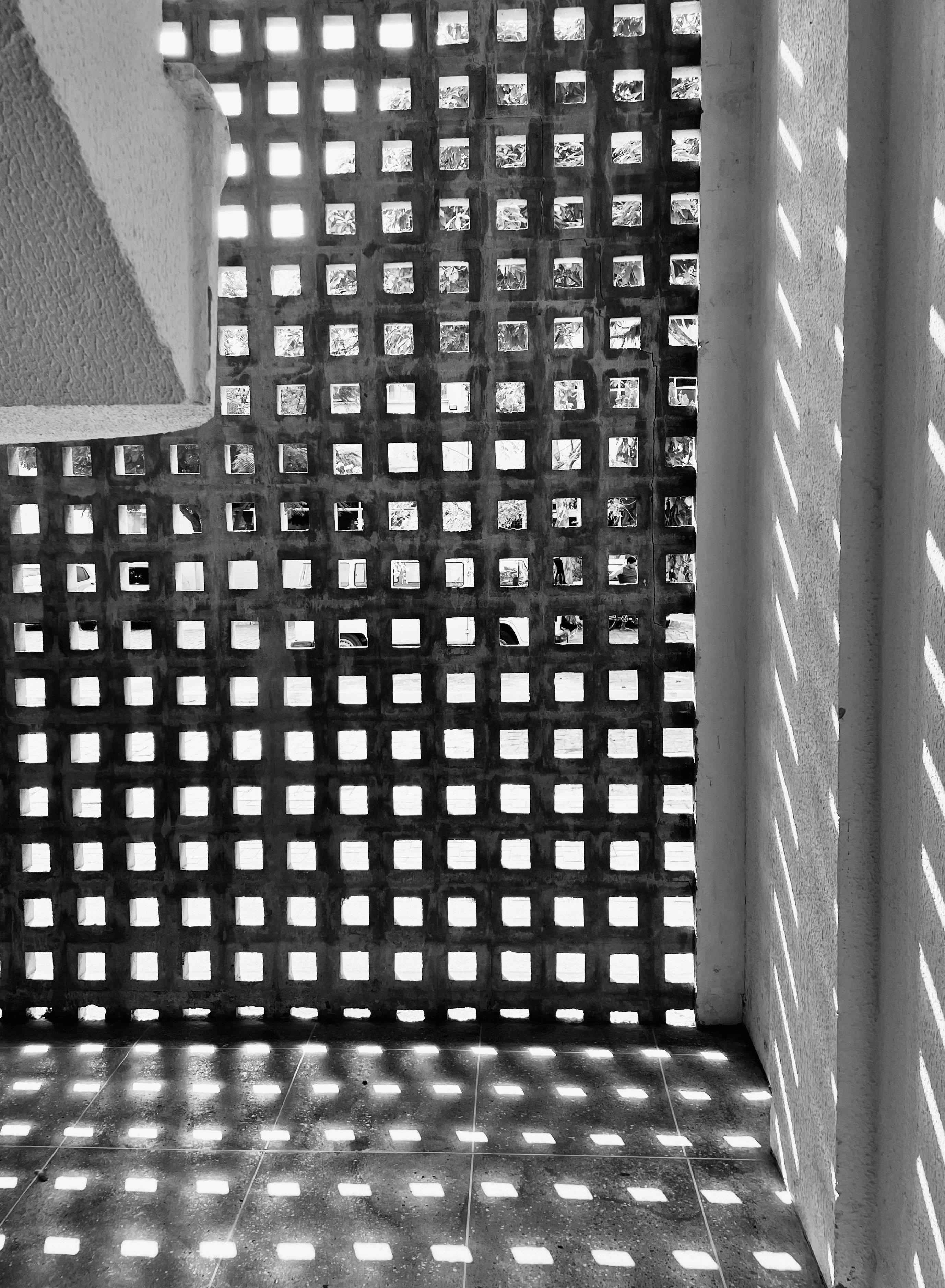 Latticed Light: Geometric Shadows on a Concrete Terrace