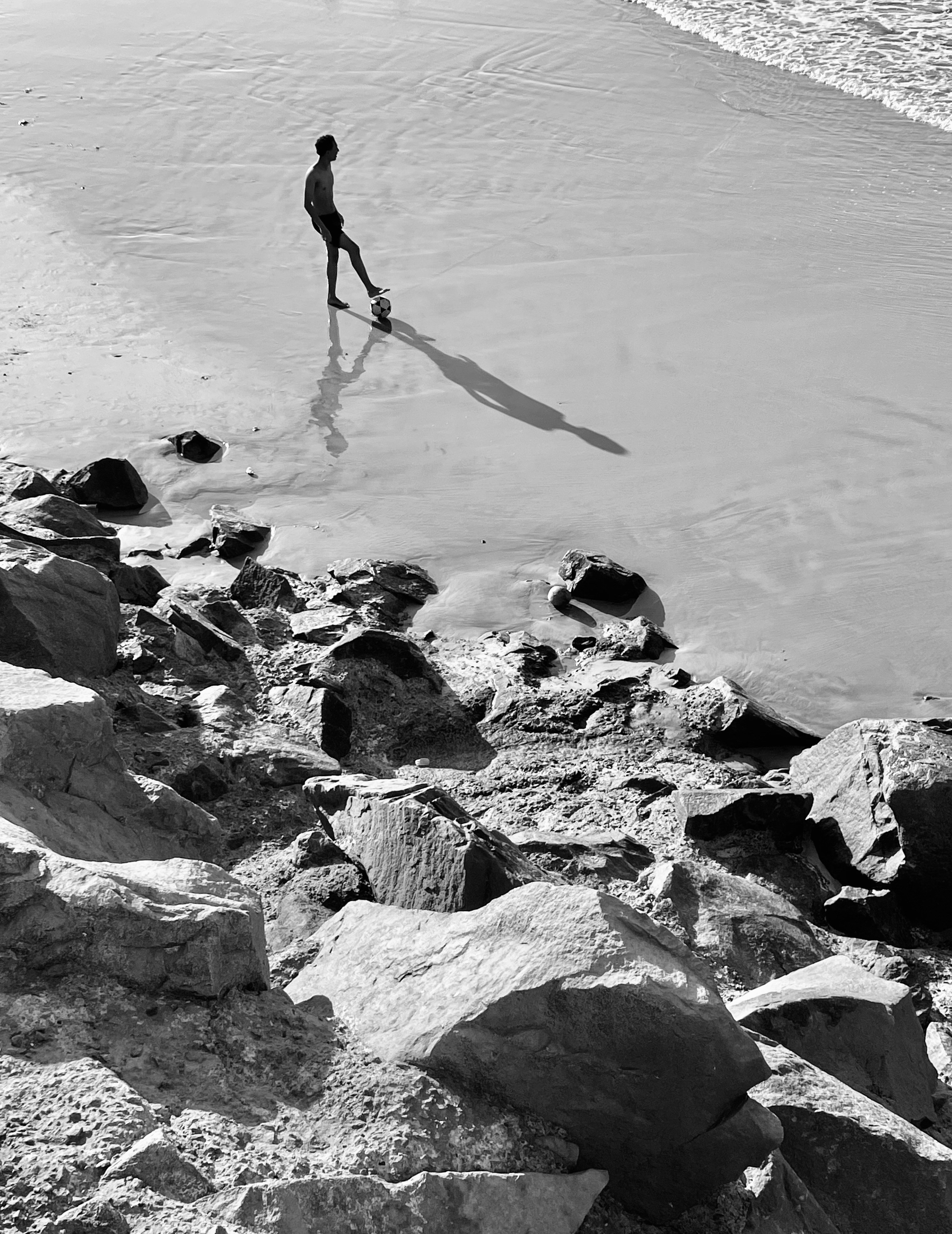 Solitary Skater on a Quiet Shore