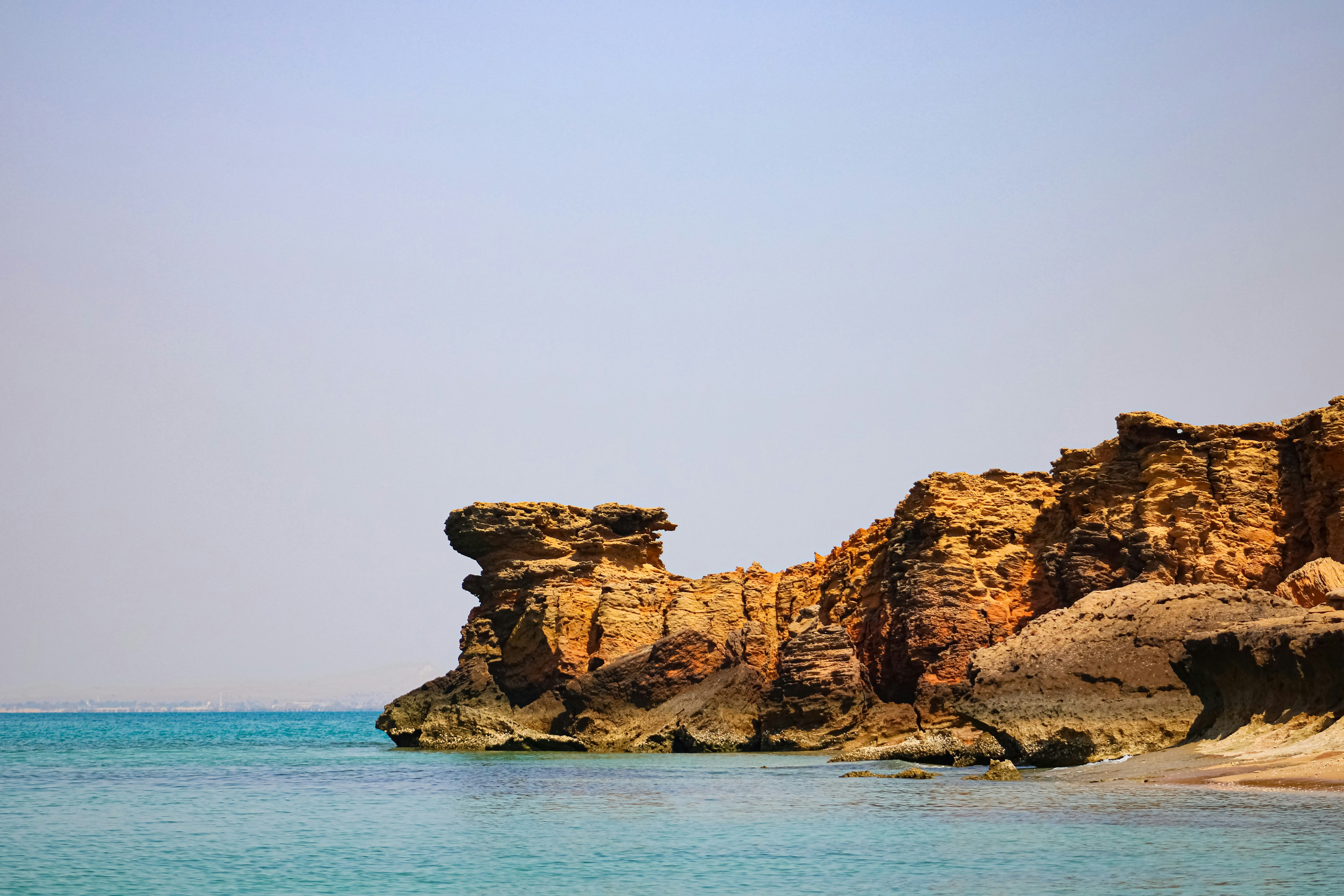 Limestone Sea Cliffs Framing a Calm Coastal Horizon
