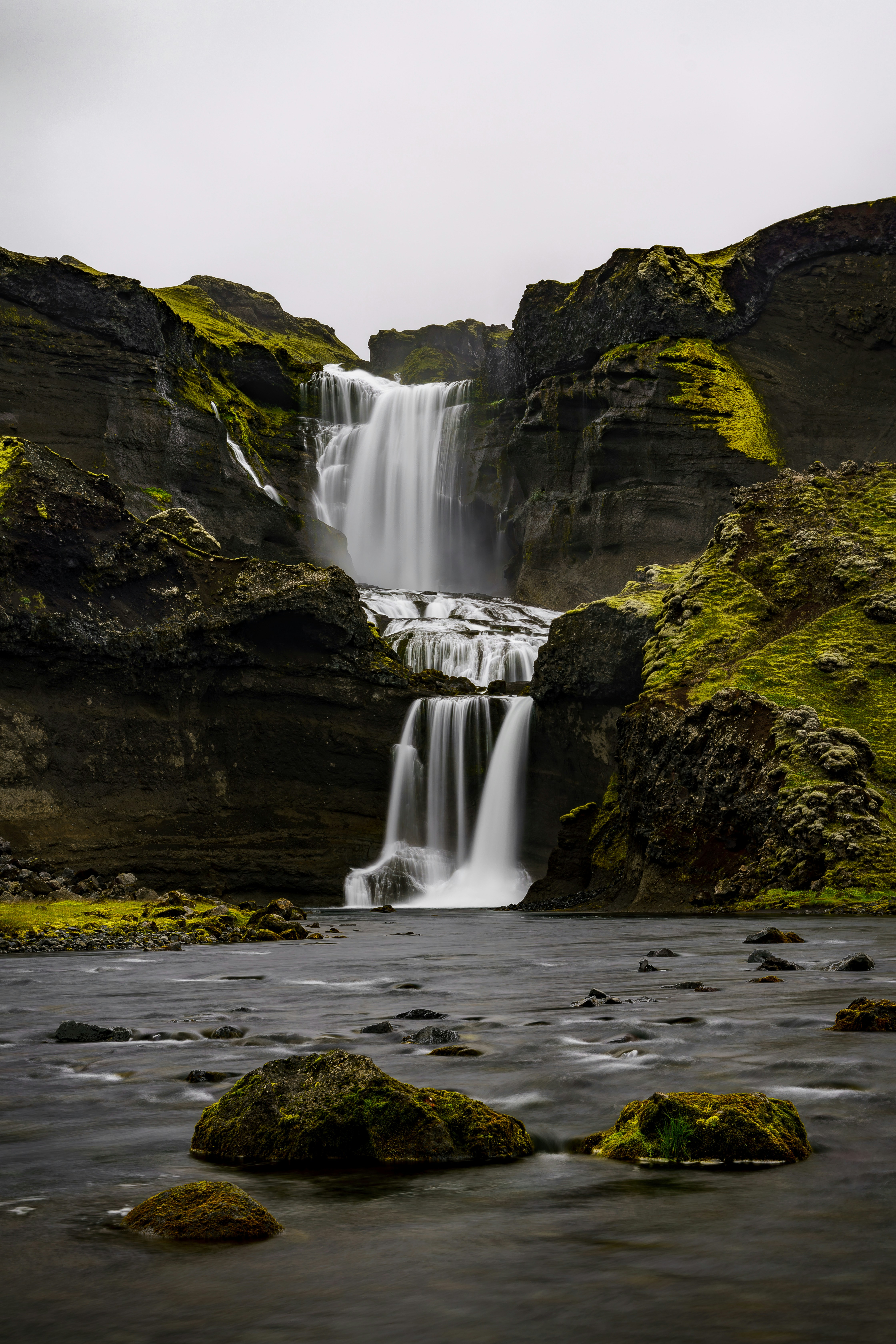 Moss-Clad Canyon Falls: A Tiered Icelandic Cascade