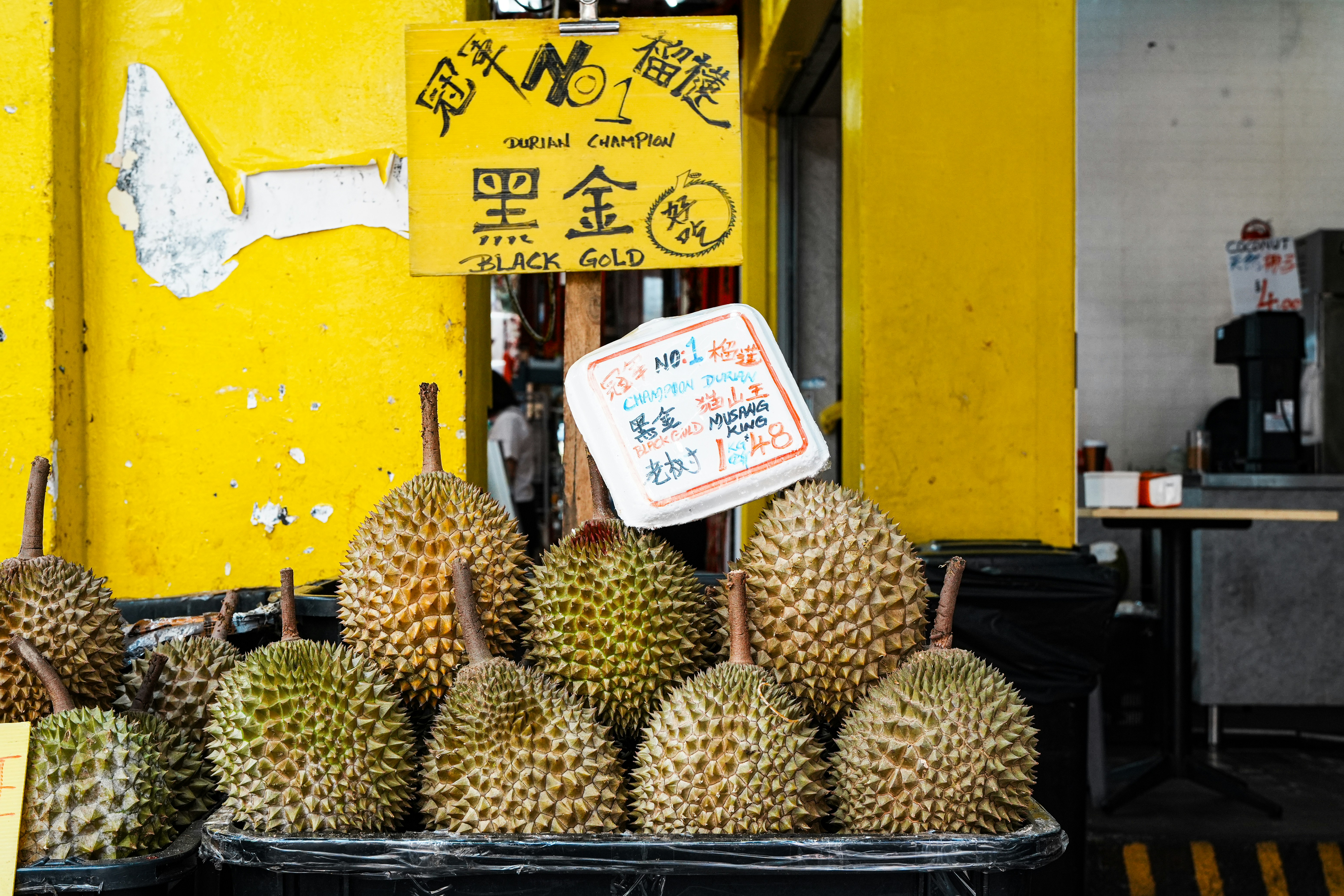 Golden Spikes: A Market Stall of Durian Thresholds