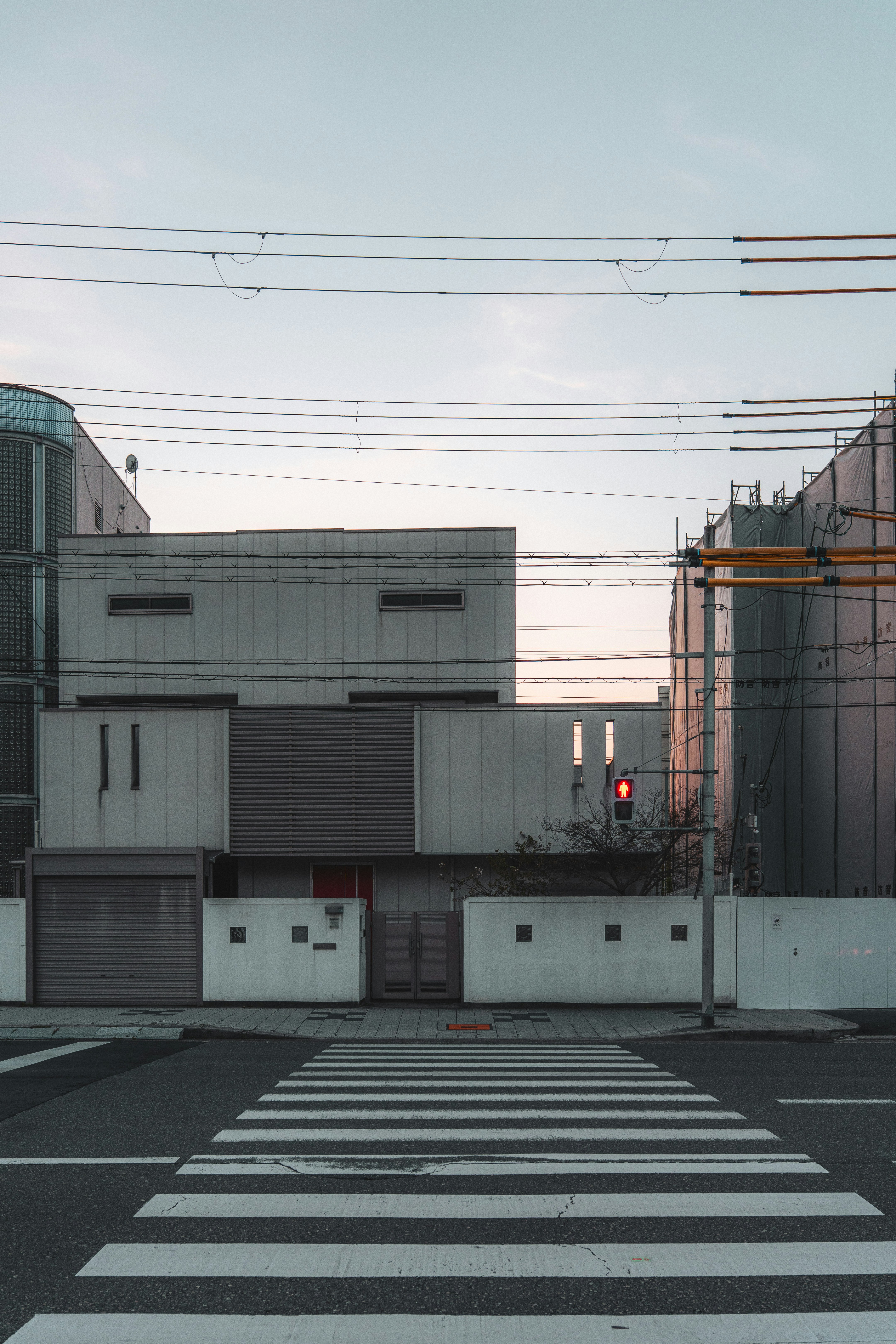 Crosswalk to a Quiet Factory Dawn