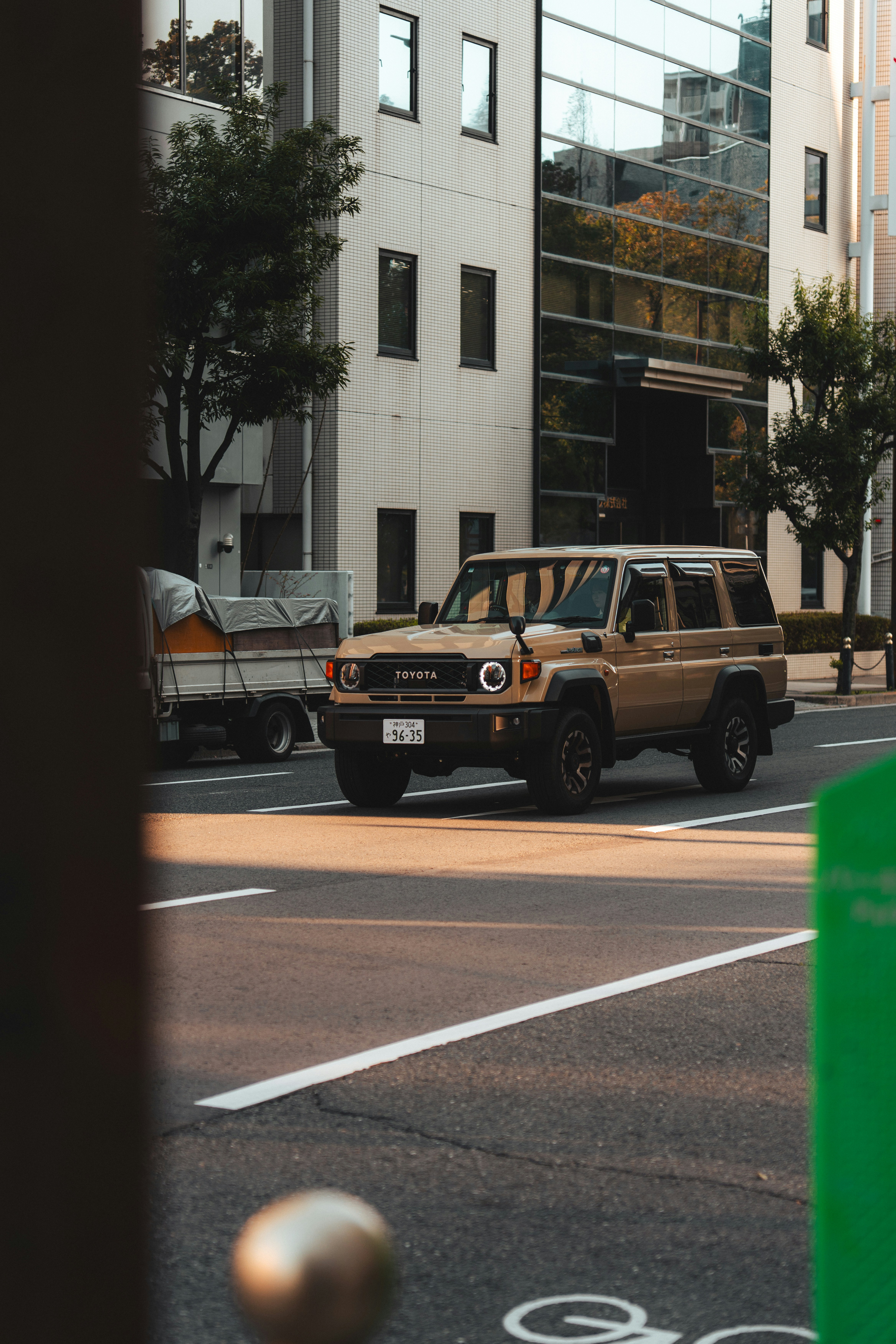 Urban SUV in Motion: Toyota on a Quiet City Street